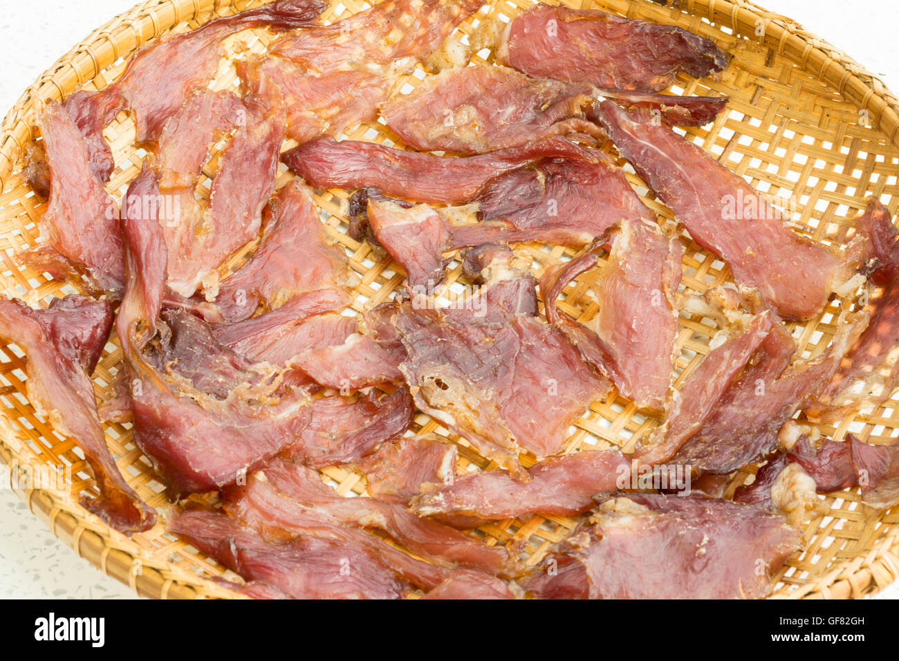 Sun dried beef on the threshing basket Stock Photo - Alamy