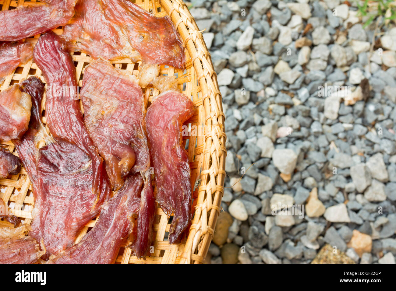 Sun dried beef on the threshing basket Stock Photo - Alamy