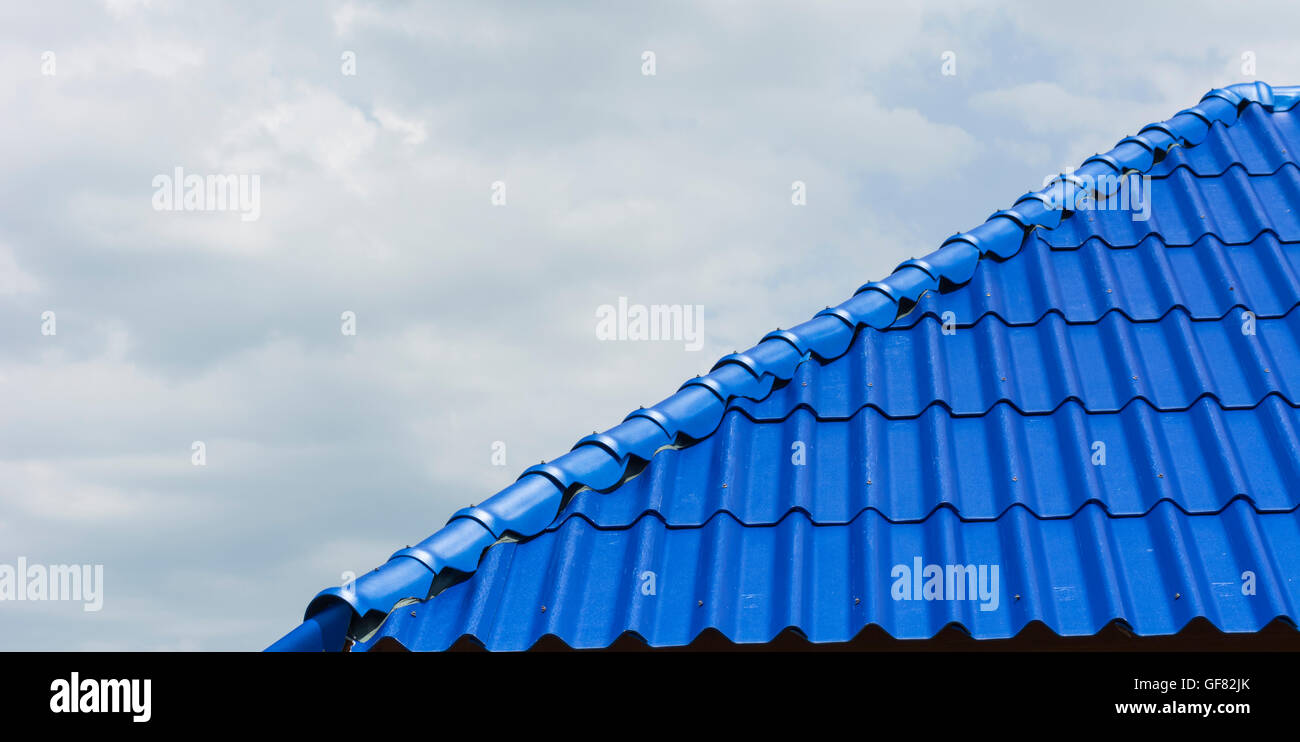 The blue pattern roof texture with sky background Stock Photo - Alamy