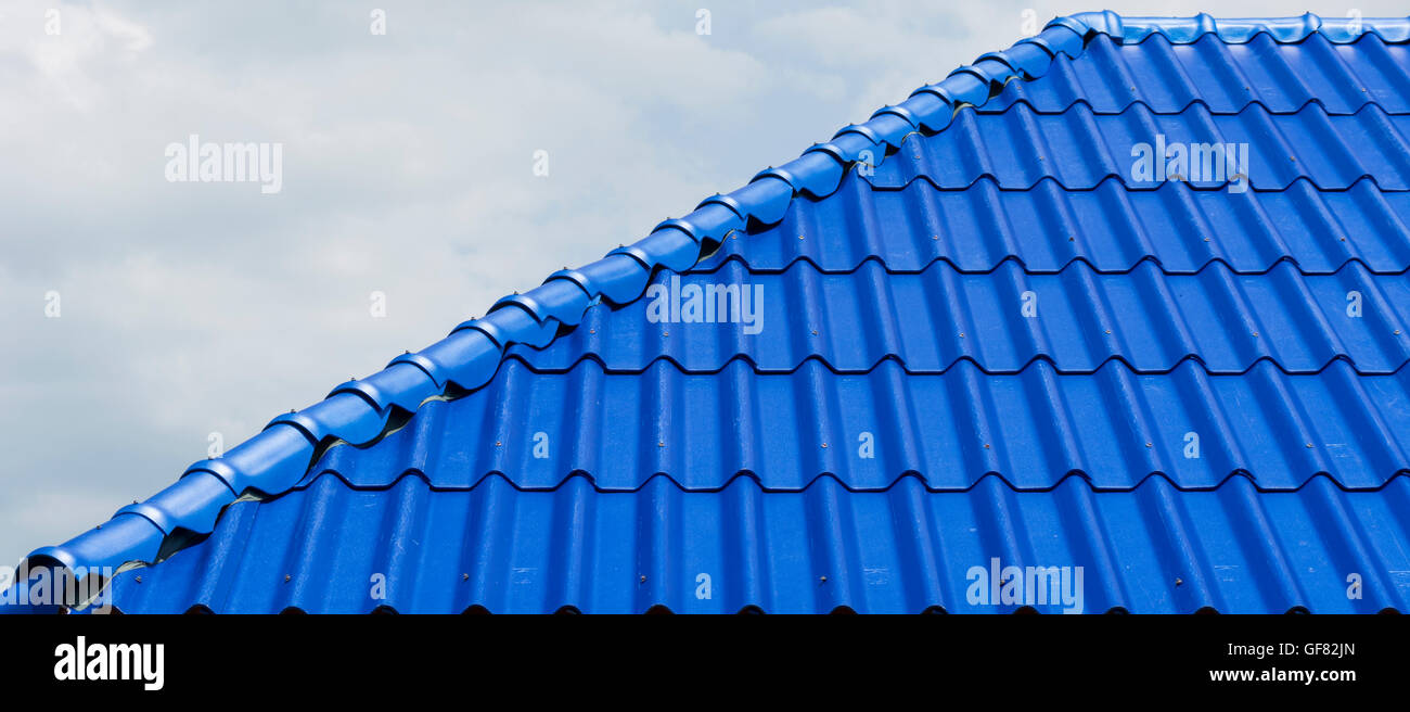 The blue pattern roof texture with sky background Stock Photo - Alamy