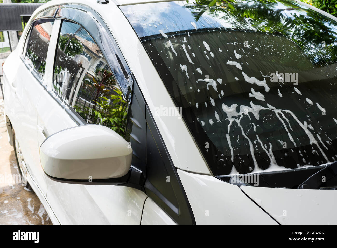 soap bubbles on car window before car wash Stock Photo - Alamy