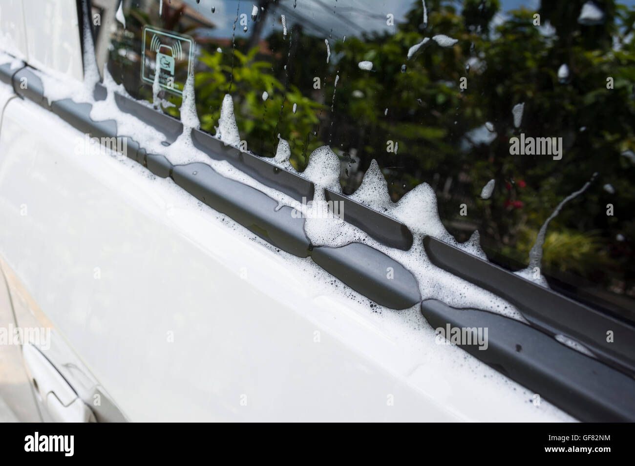 soap bubbles on car window before car wash Stock Photo - Alamy