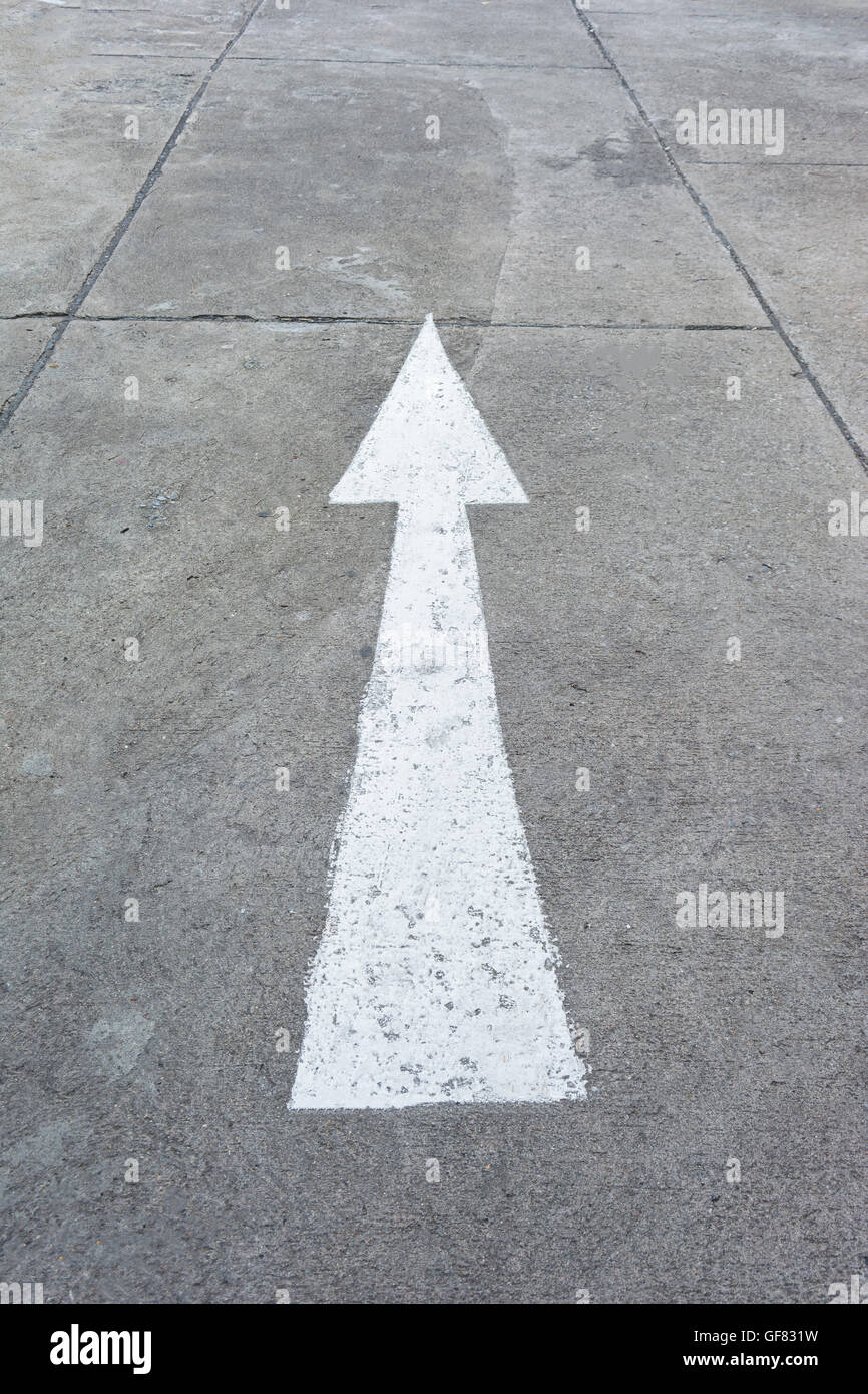 Arrow signs on the road Stock Photo - Alamy