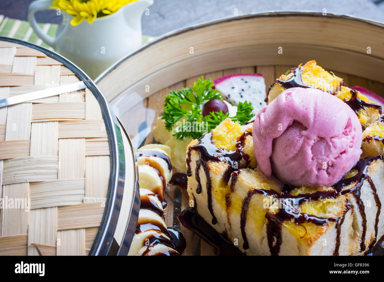 Honey toast and banana wtih dry ice on table background Stock Photo - Alamy