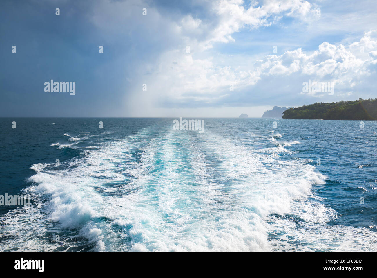 view behind the speed boat and rain cloud coming half sky Stock Photo ...