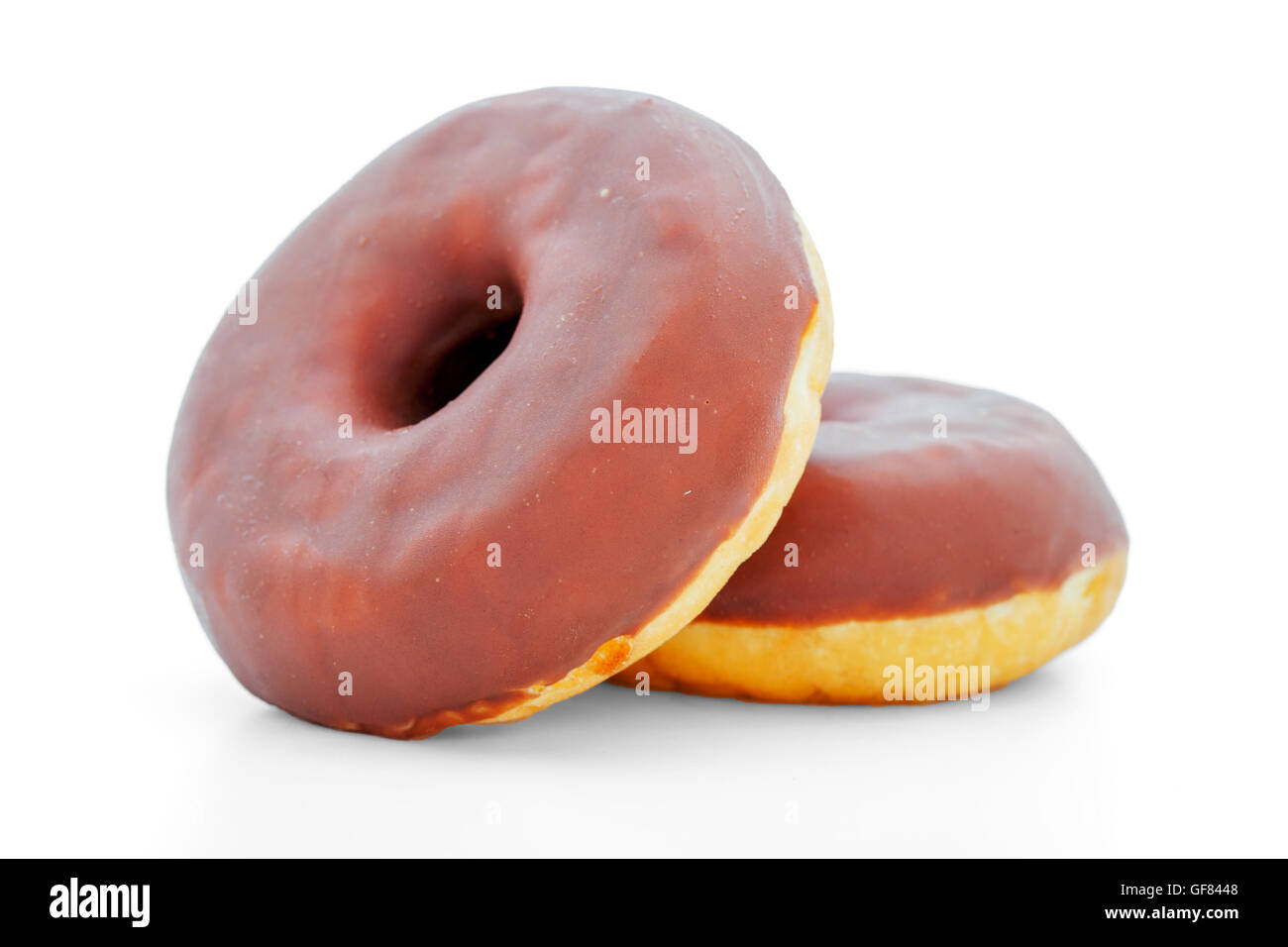 Two chocolate donuts on a white background Stock Photo - Alamy