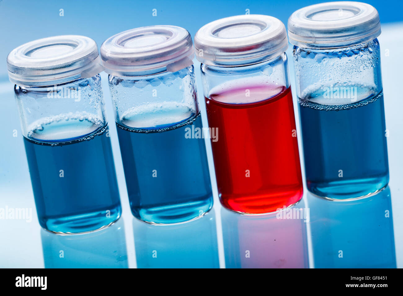 vials filled with colored liquids Stock Photo - Alamy
