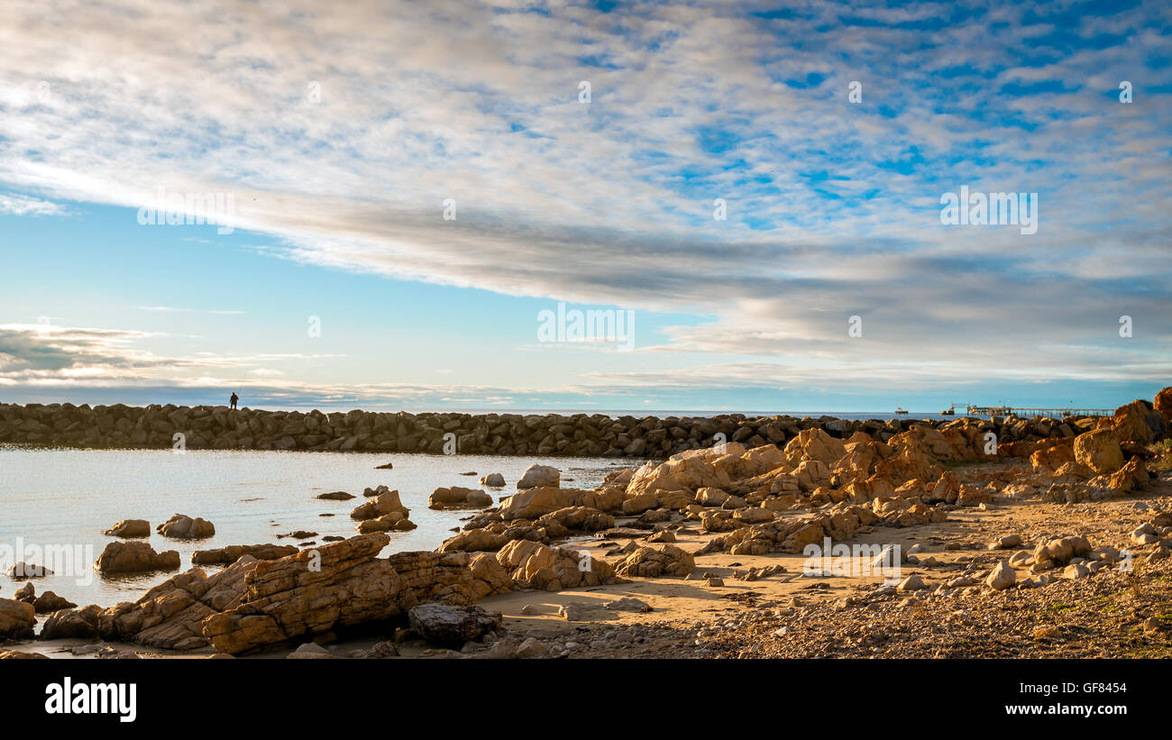 Fisherman standing at the rocky beach, South Australian shore Stock ...