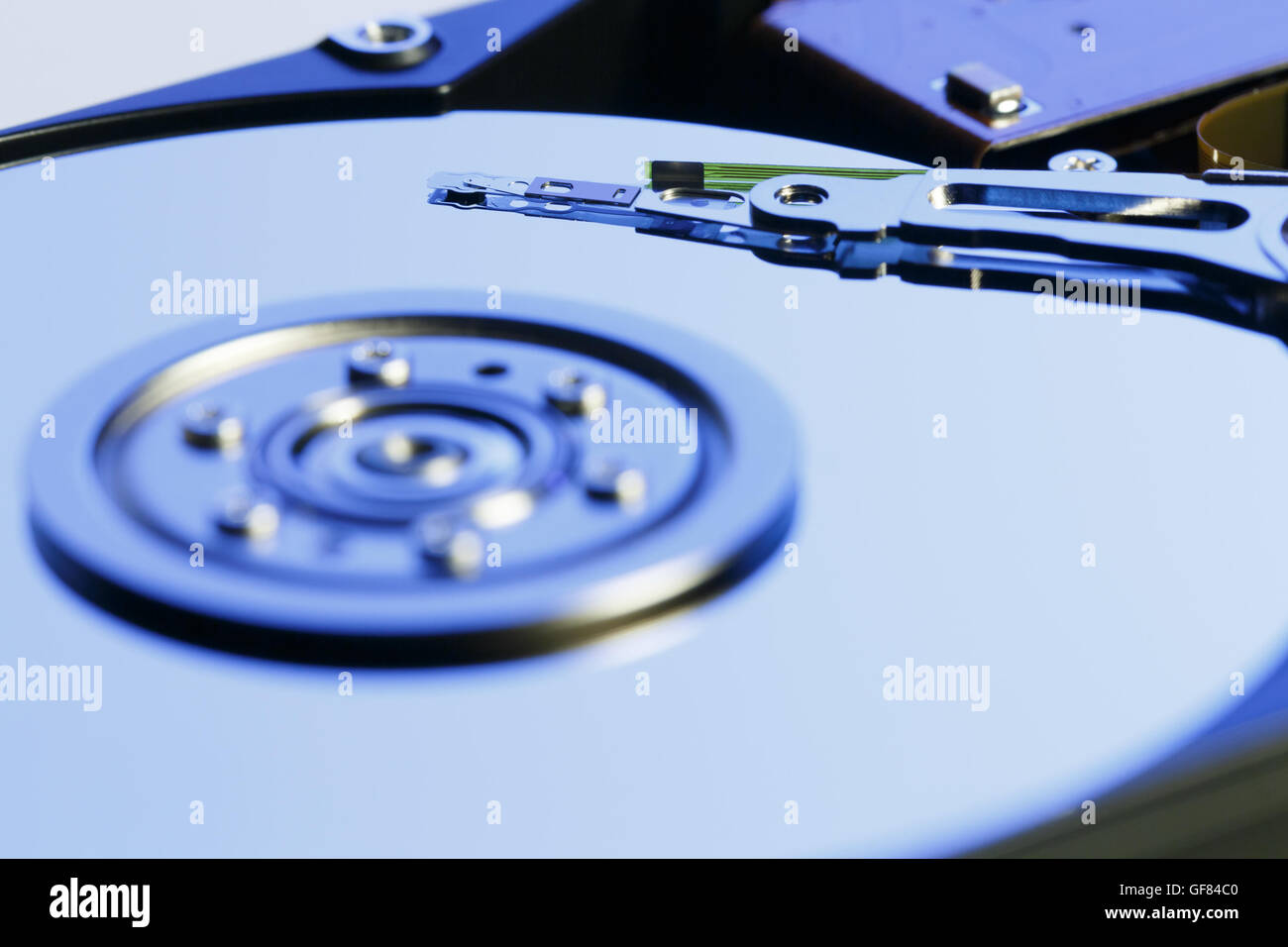 Close up inside of Harddrive (HDD) on white background Stock Photo - Alamy