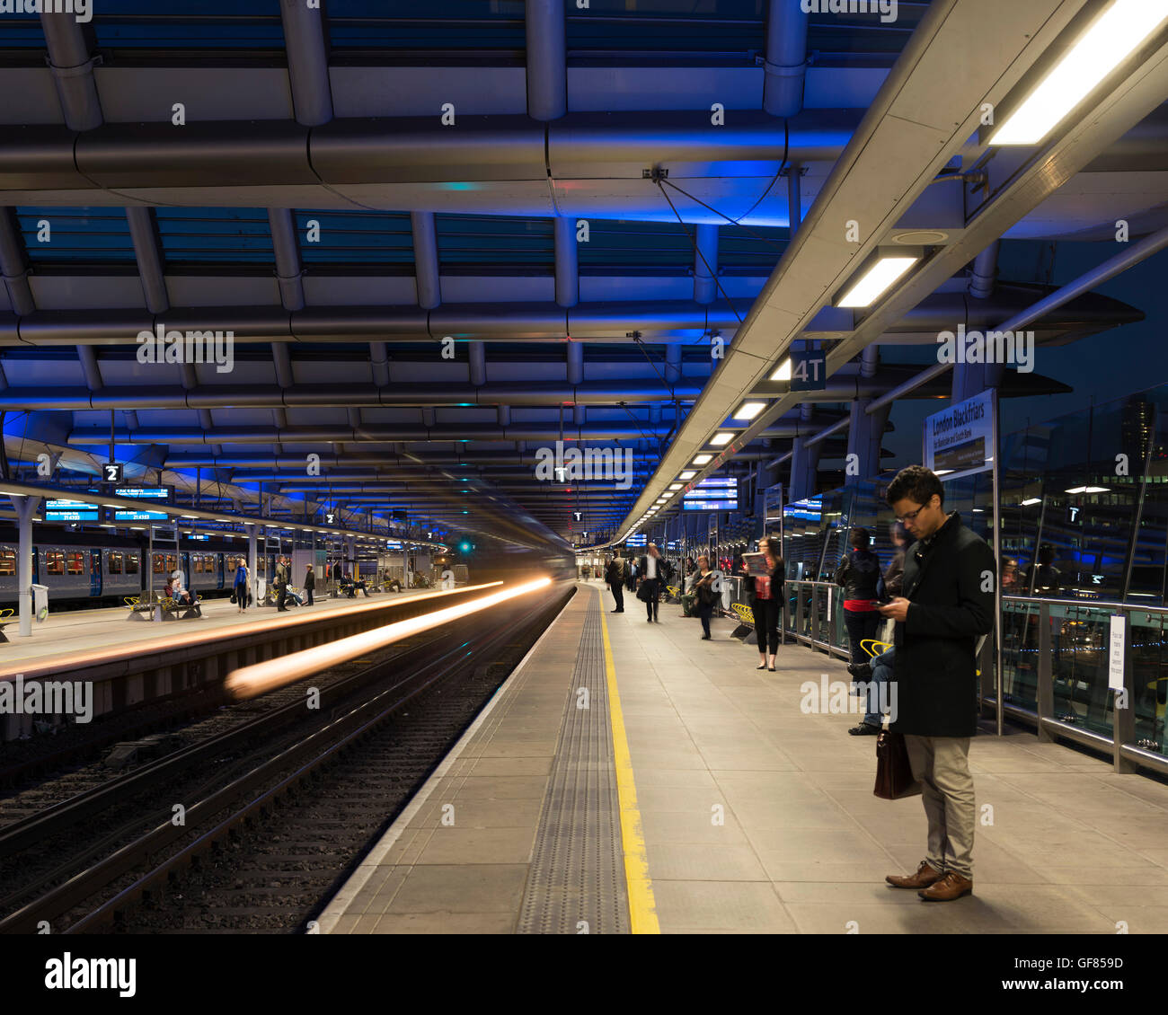 View along platform with passengers. Blackfriars Station, London ...