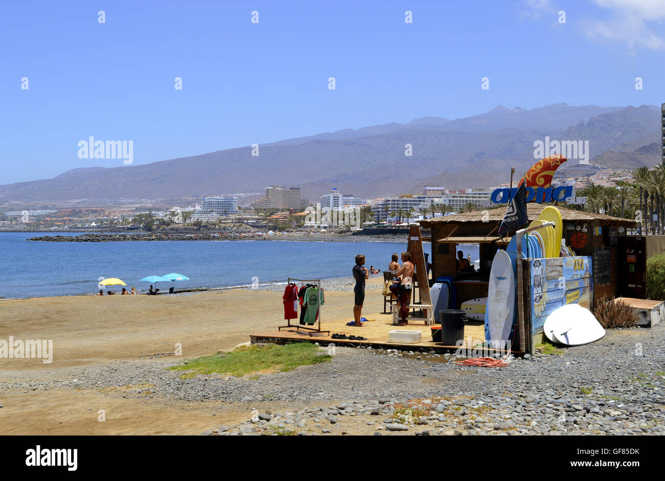 Surf shack with surfers and surf boards on the beach Stock Photo - Alamy