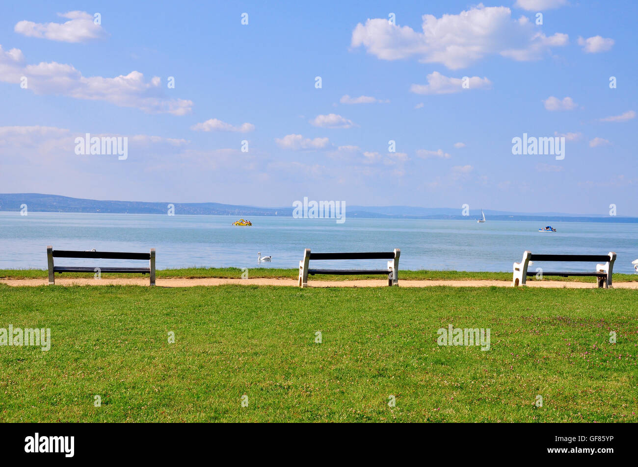 Benches at the lake Stock Photo - Alamy