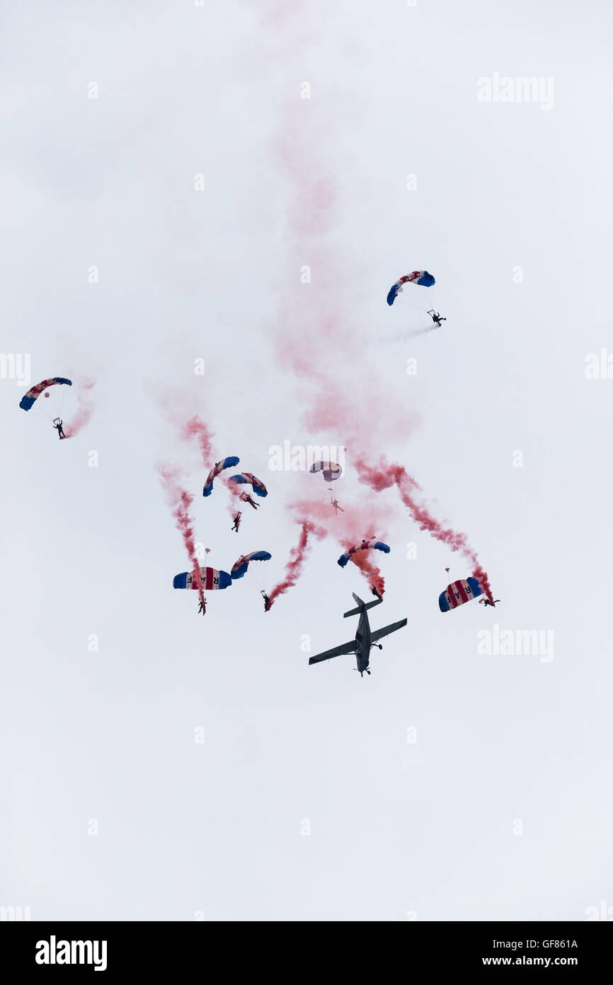 The RAF Falcons parachute display team jump from an aircraft at the ...
