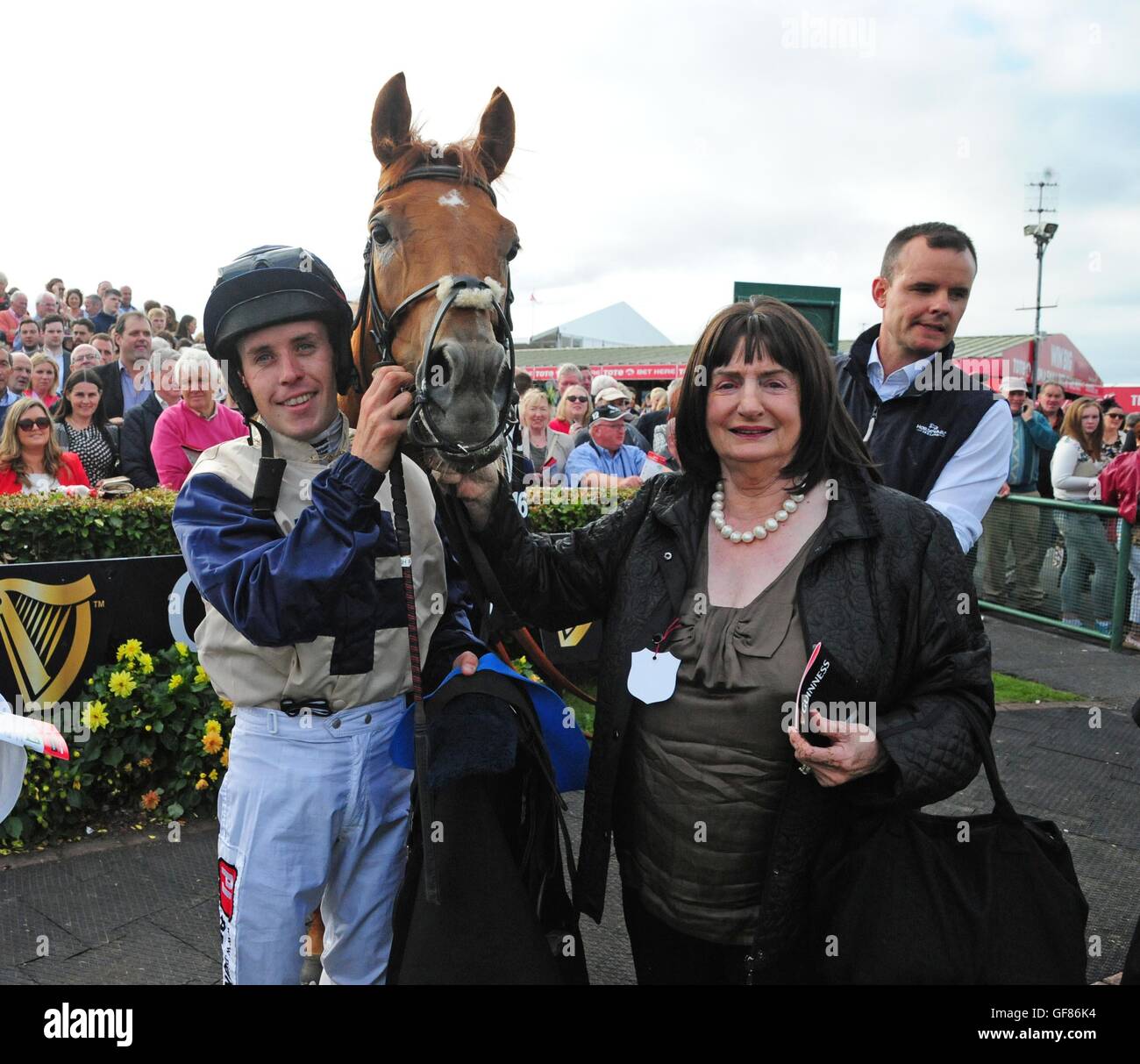 Jockey Leigh Roche with owner Patricia Regan after winning the Featured ...