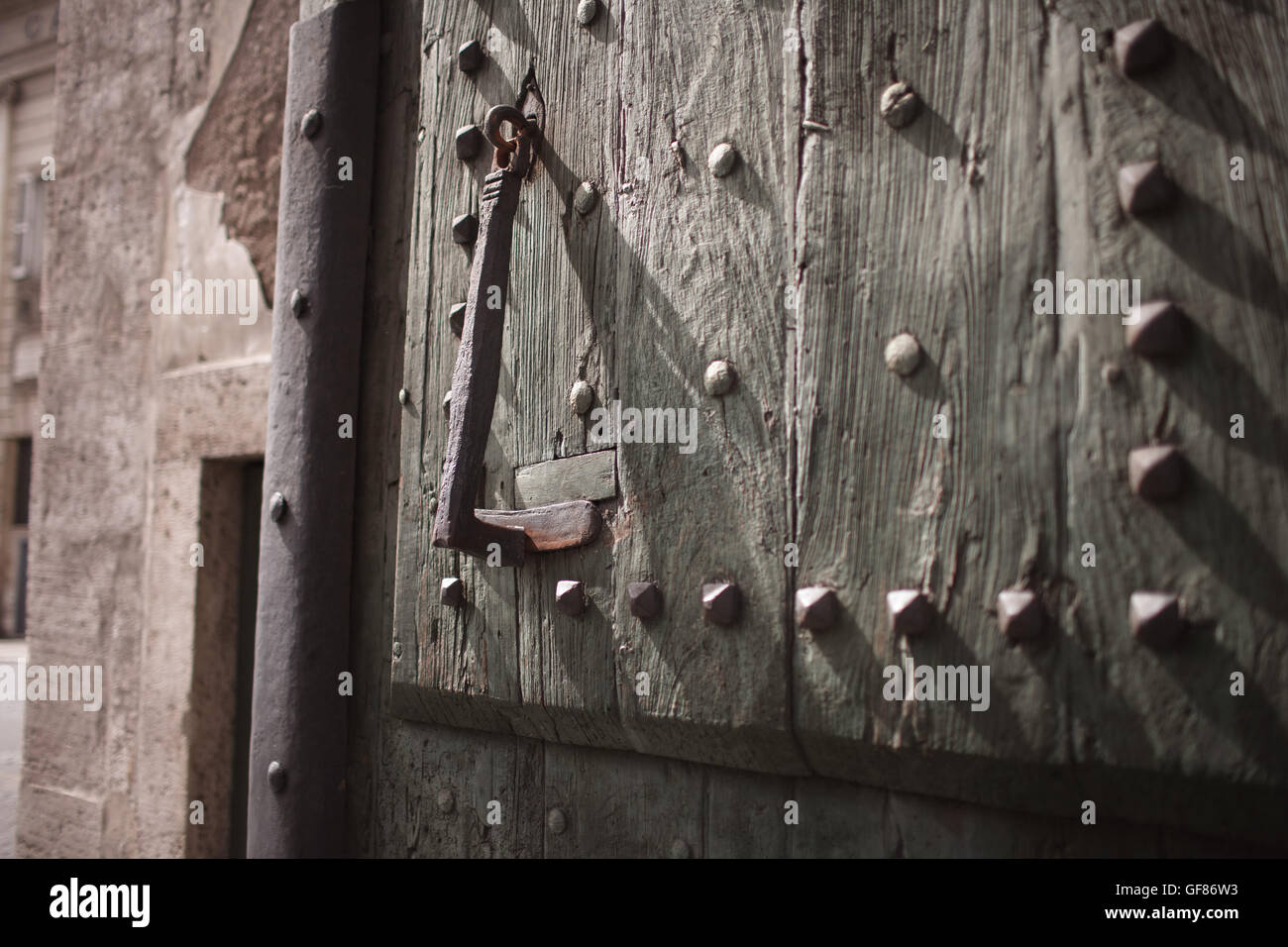 old gate bells in rome Stock Photo - Alamy