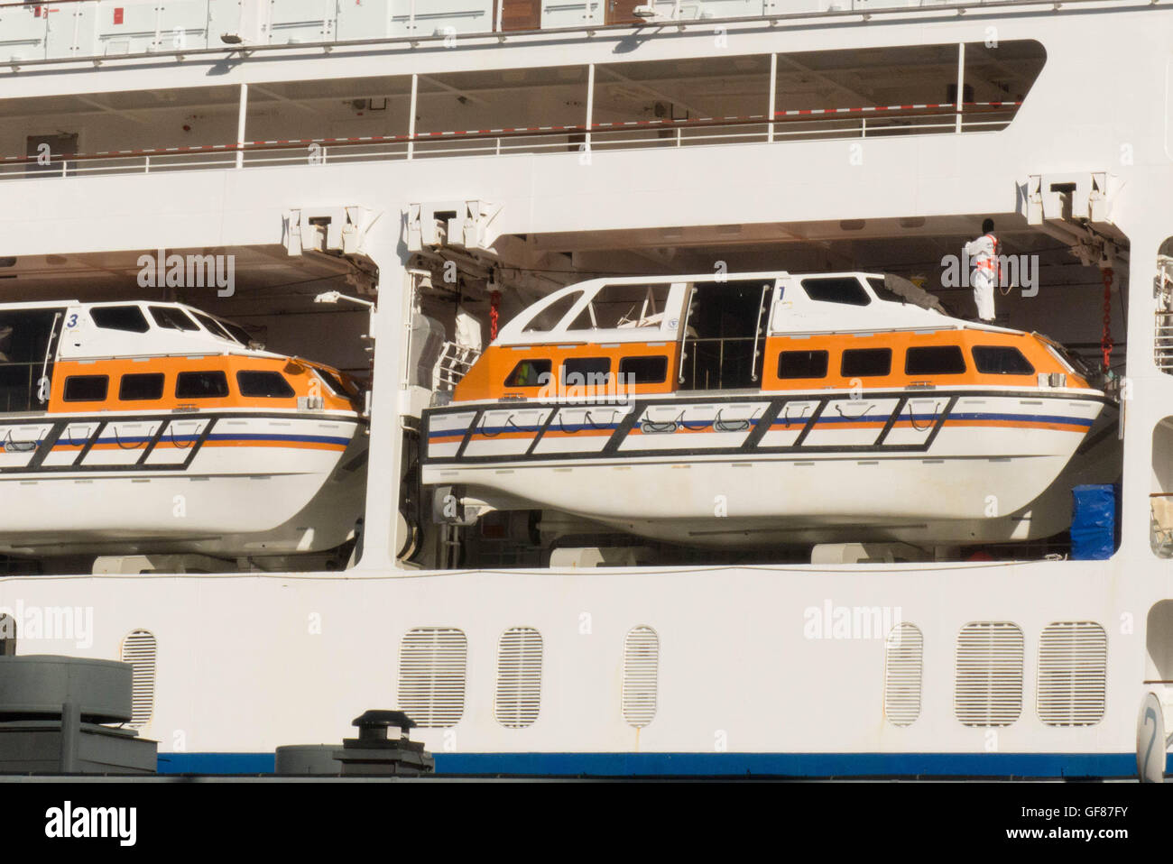 Cruise liner stern with flag and rescue boats Stock Photo - Alamy