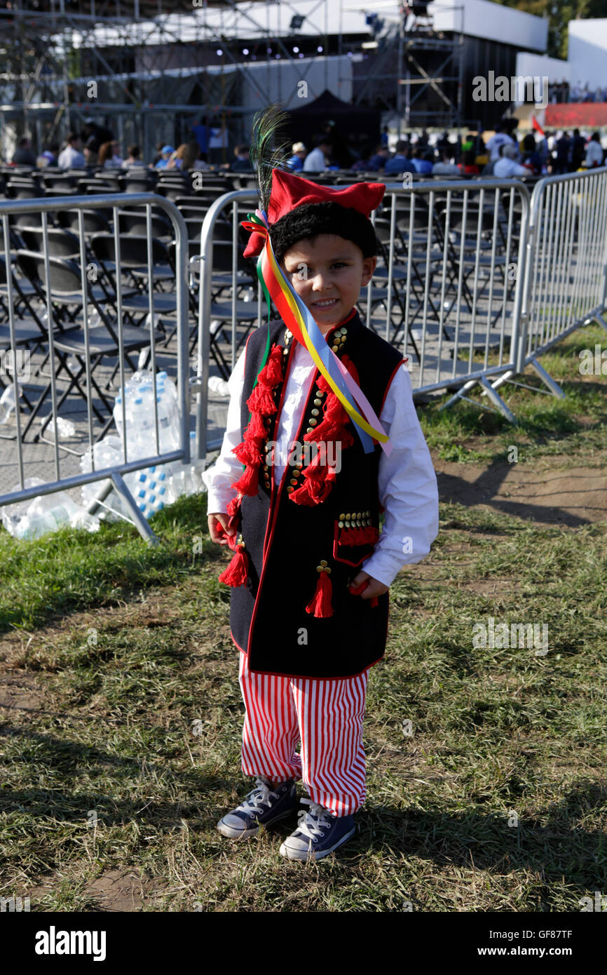 Krakow, Poland. 29th July, 2016. A boy poses in traditional Polish ...