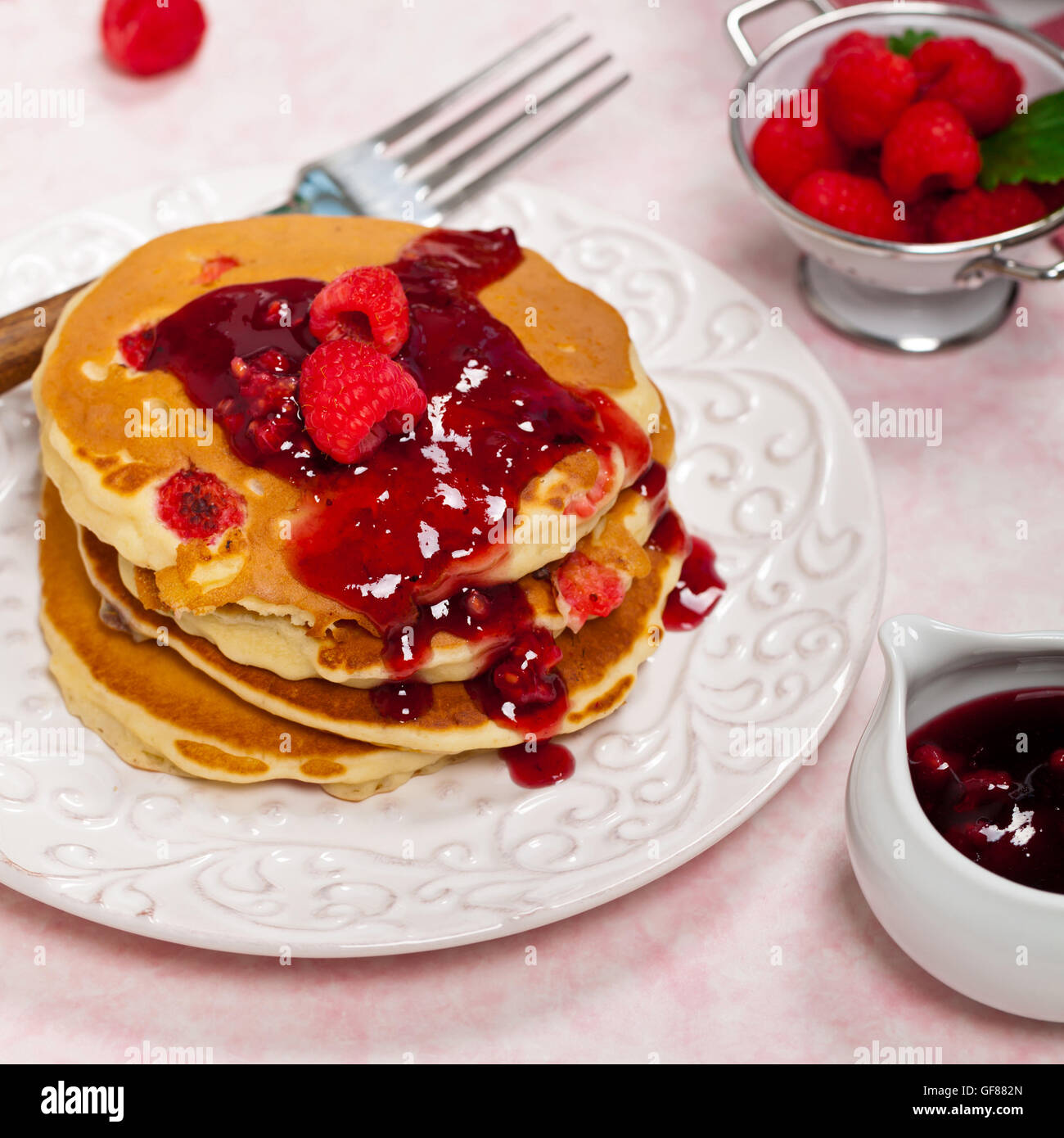 Pancakes with Raspberry Sauce Stock Photo - Alamy