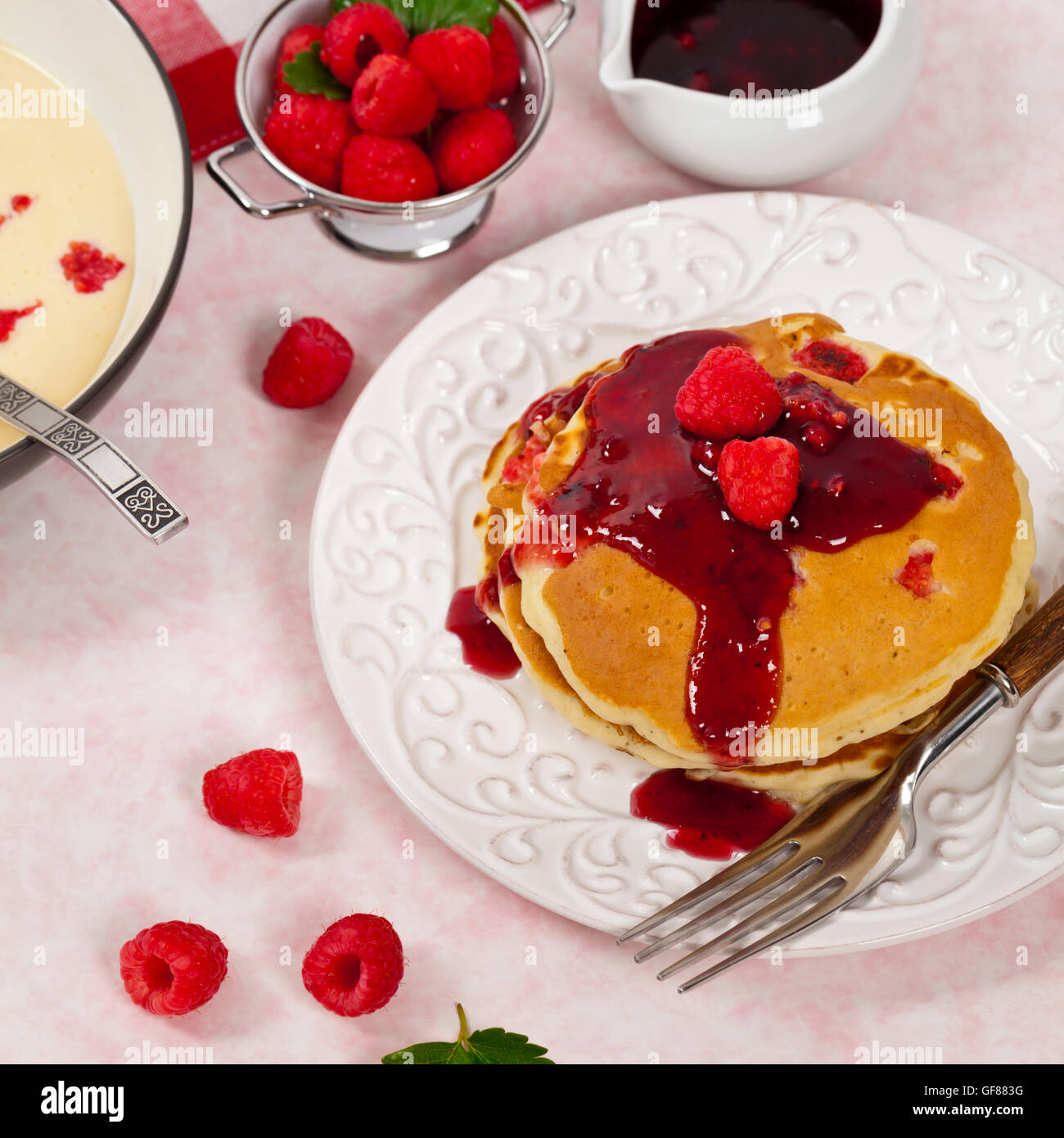 Pancakes with Raspberry Sauce Stock Photo - Alamy