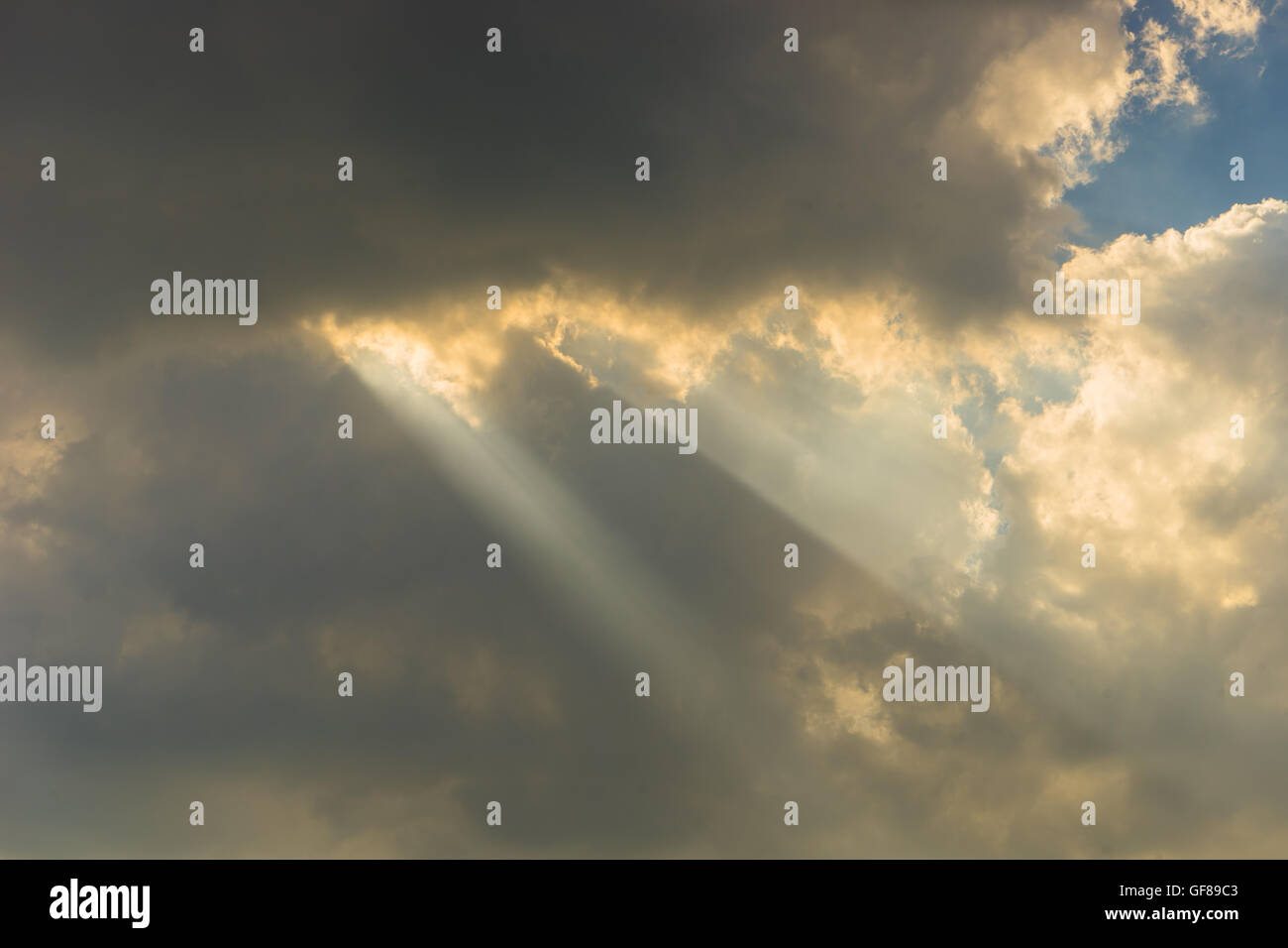 Rays of light shining down Stock Photo - Alamy