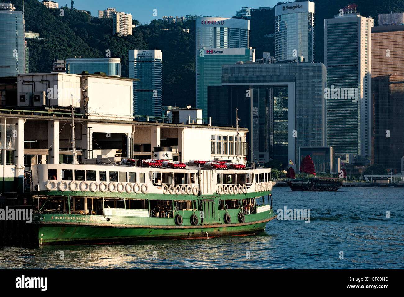 The Star ferry terminal, and central district city skyline, Victoria ...