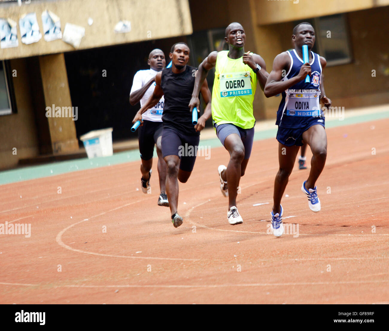Ugandan athletes racing during the national trials at Mandela stadium ...