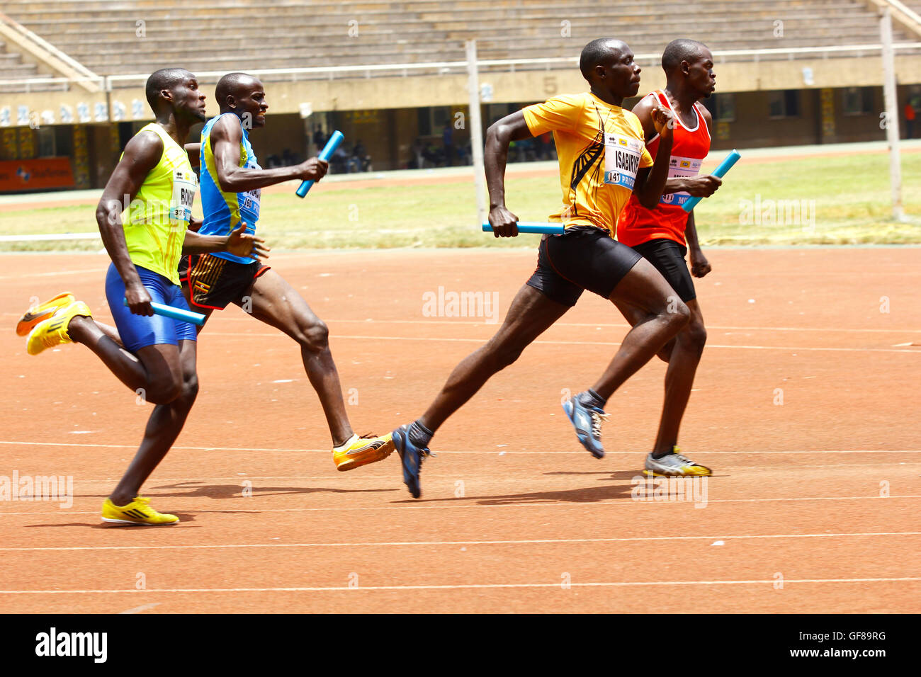 Ugandan athletes racing during the national trials at Mandela stadium ...
