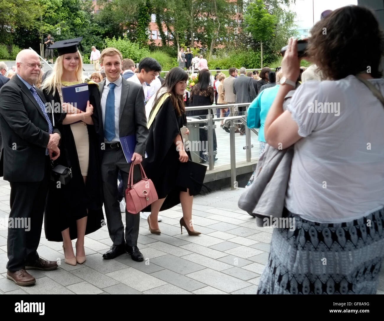 Students celebrate after receiving their degrees at Sheffield ...