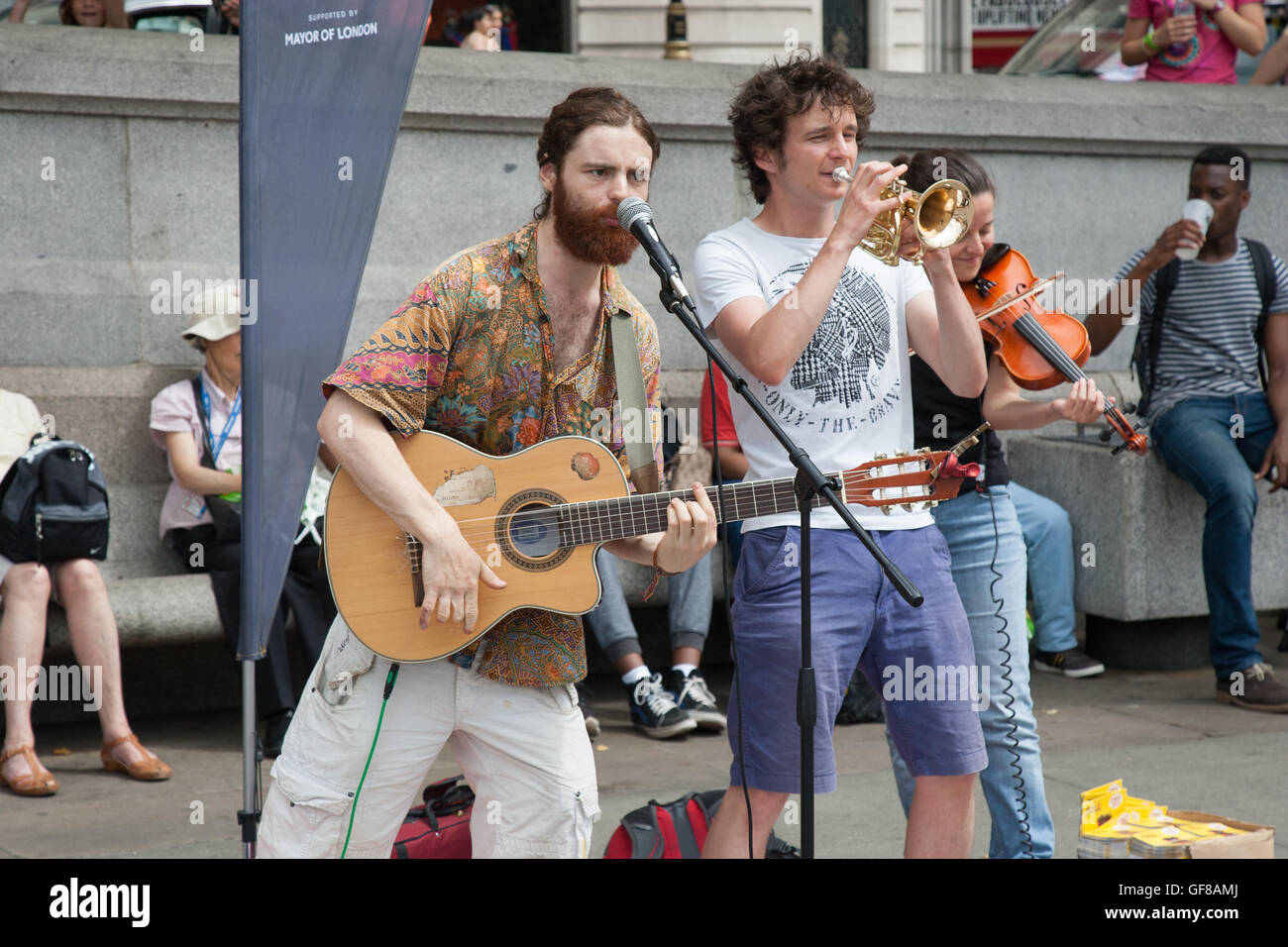 Happy people celebrating folk tradition hi-res stock photography and ...