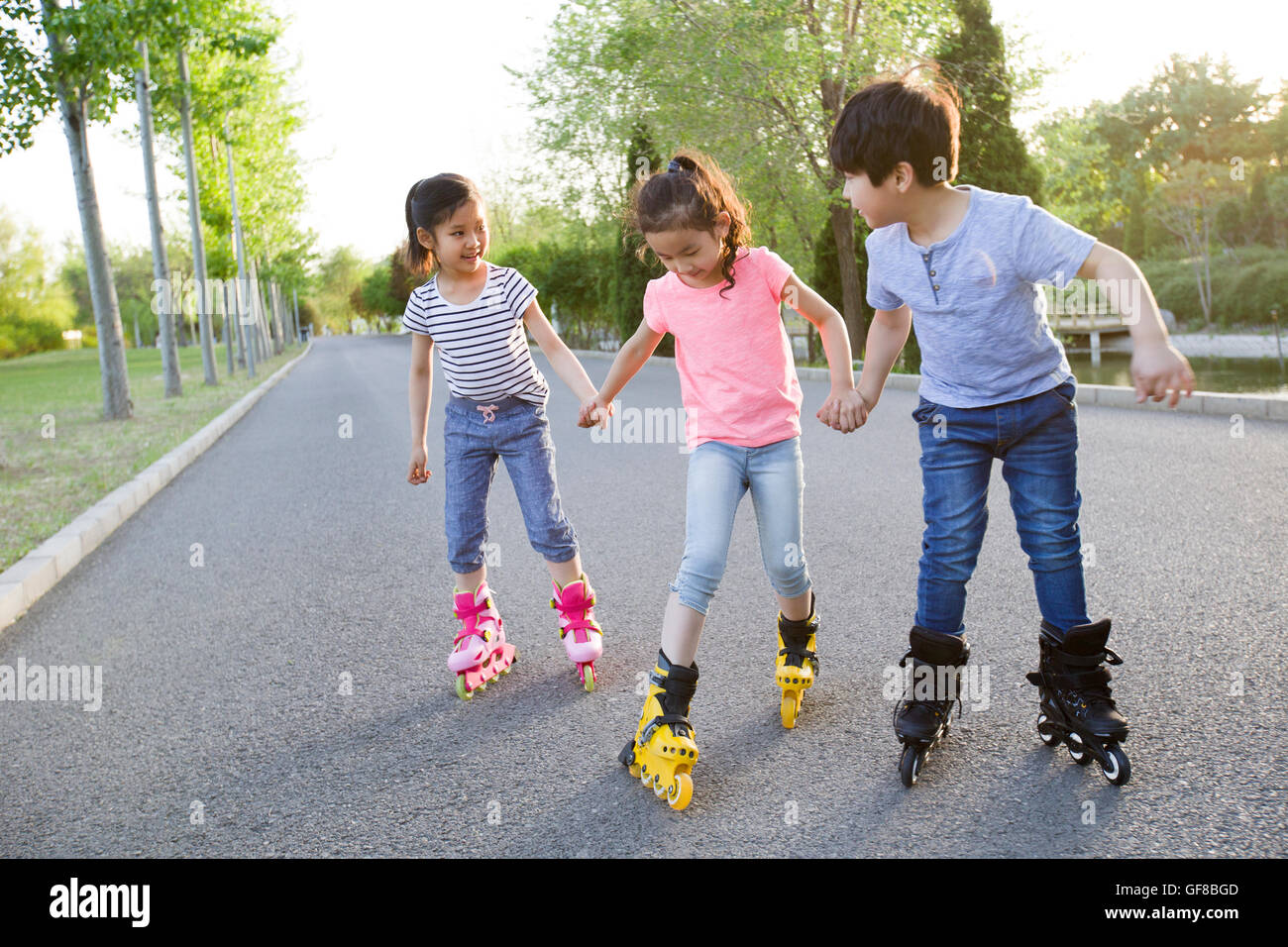 Children roller skating hi-res stock photography and images - Alamy