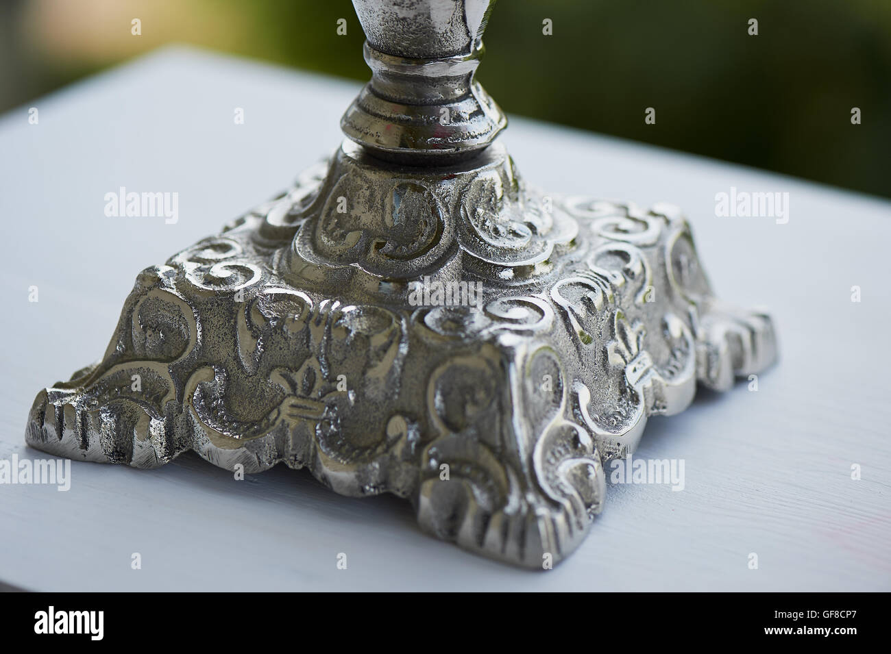 Silver metal base quality silver candlestick. Close Stock Photo - Alamy