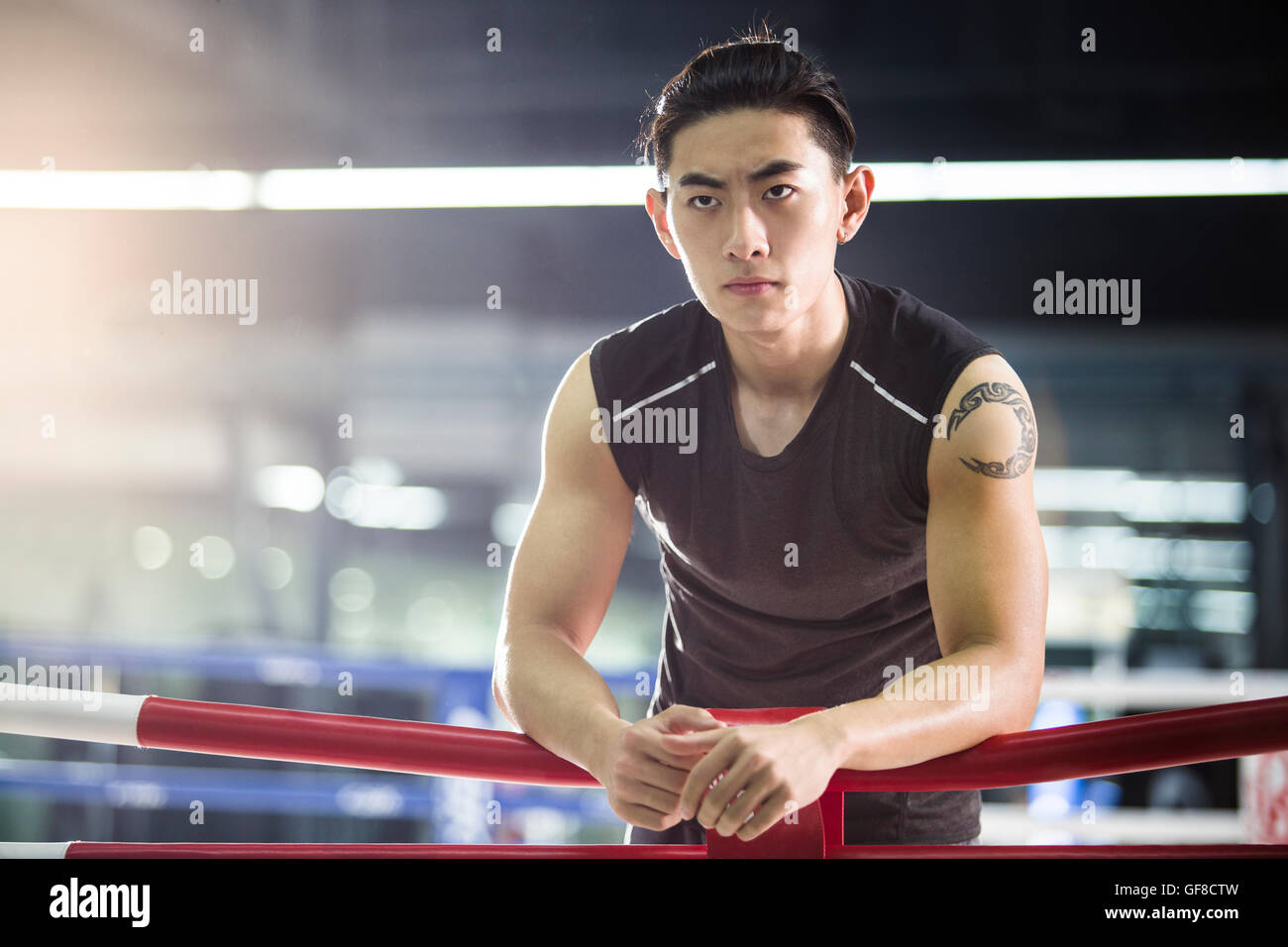 Chinese boxer resting in boxing ring Stock Photo - Alamy