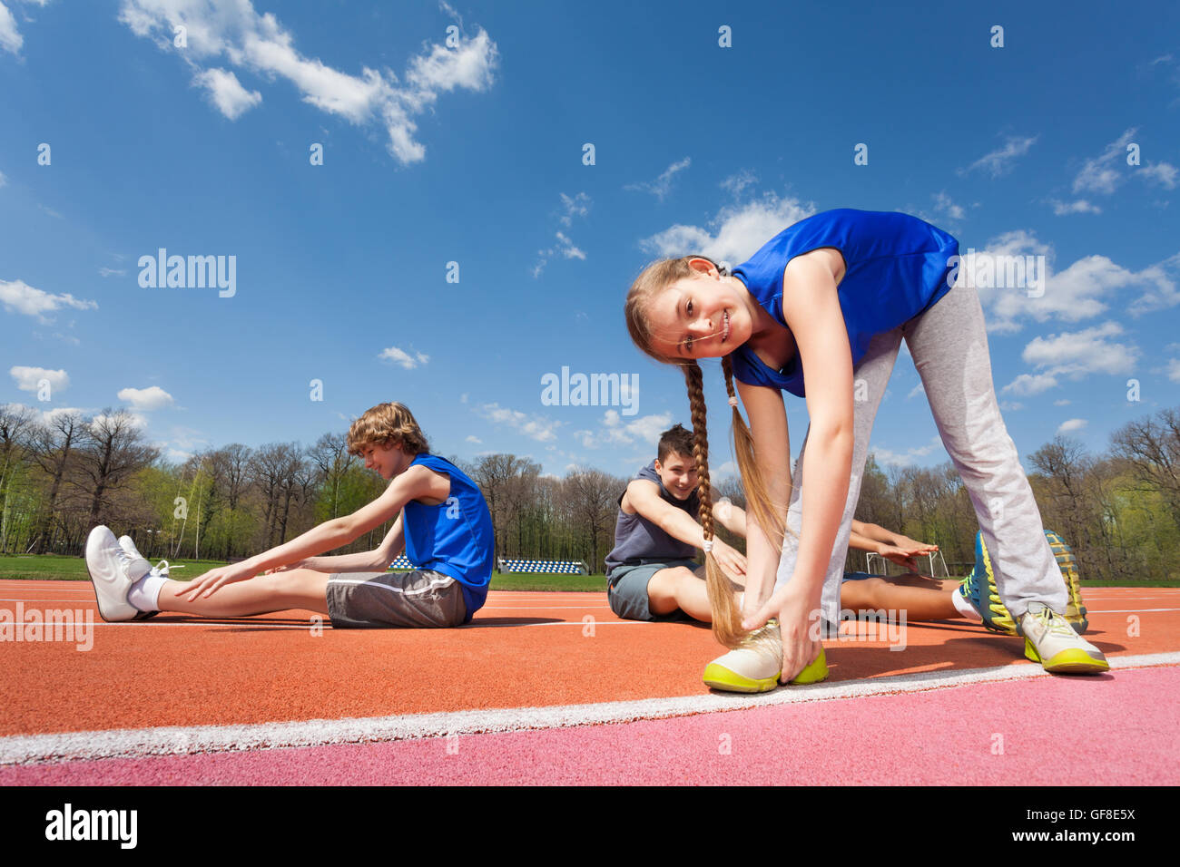 Gymnastic activity outside on the stadium Stock Photo - Alamy