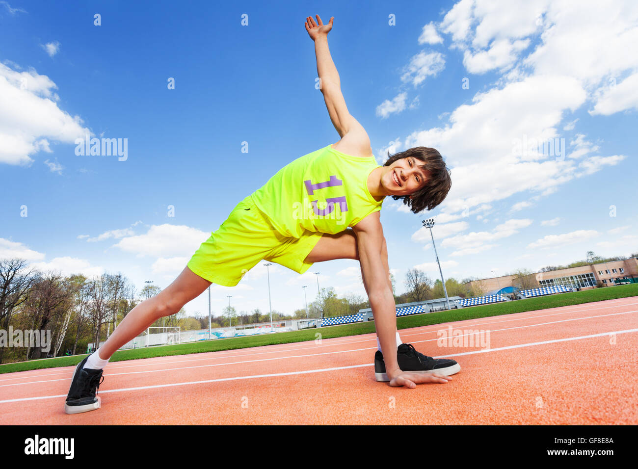 Active teenage athlete exercising outdoor Stock Photo - Alamy
