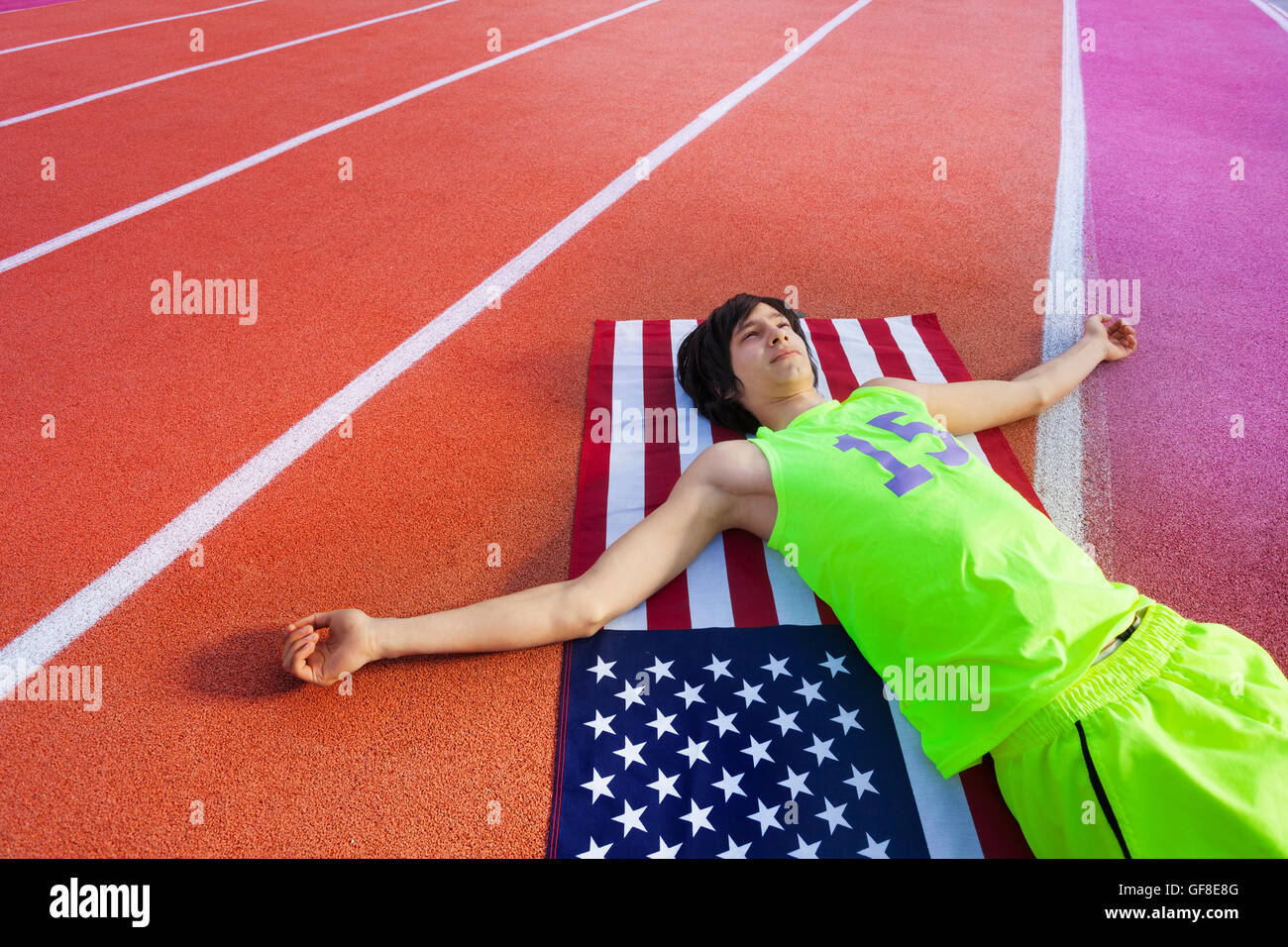 Happy American athlete having rest after marathon Stock Photo - Alamy