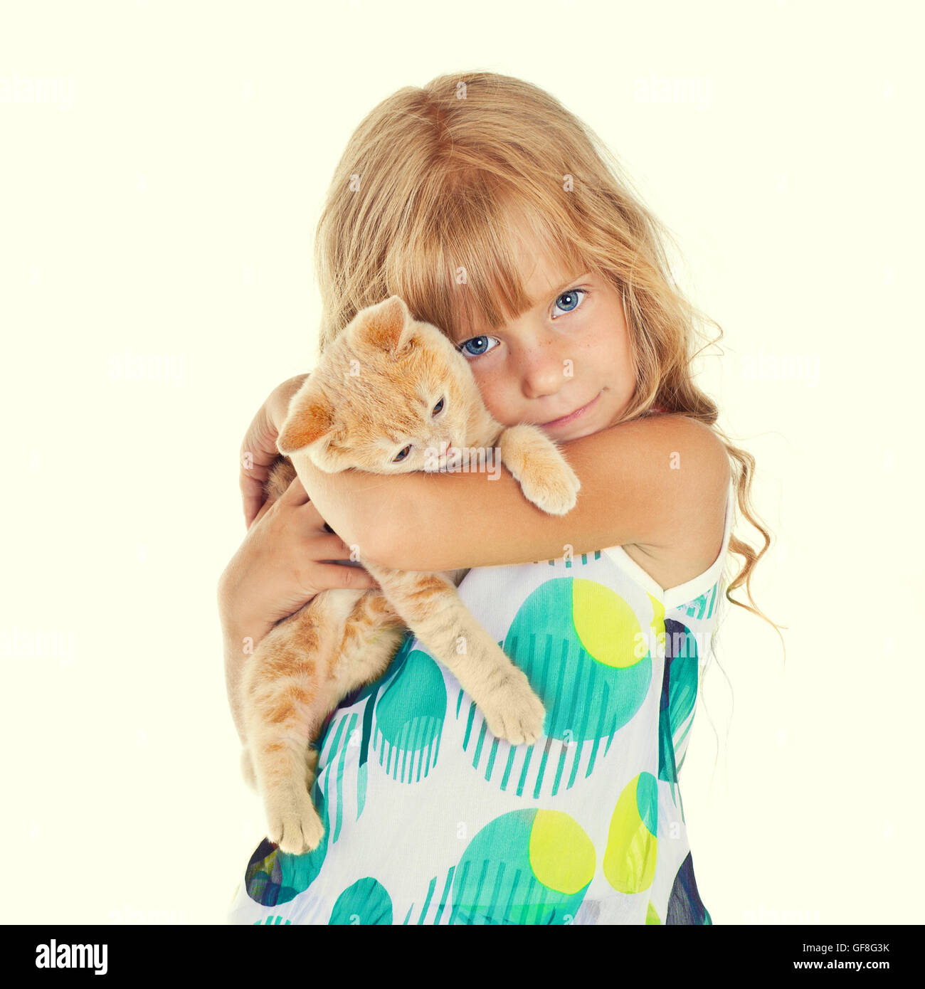 Cute girl hugging a little cat isolated on white background Stock Photo ...