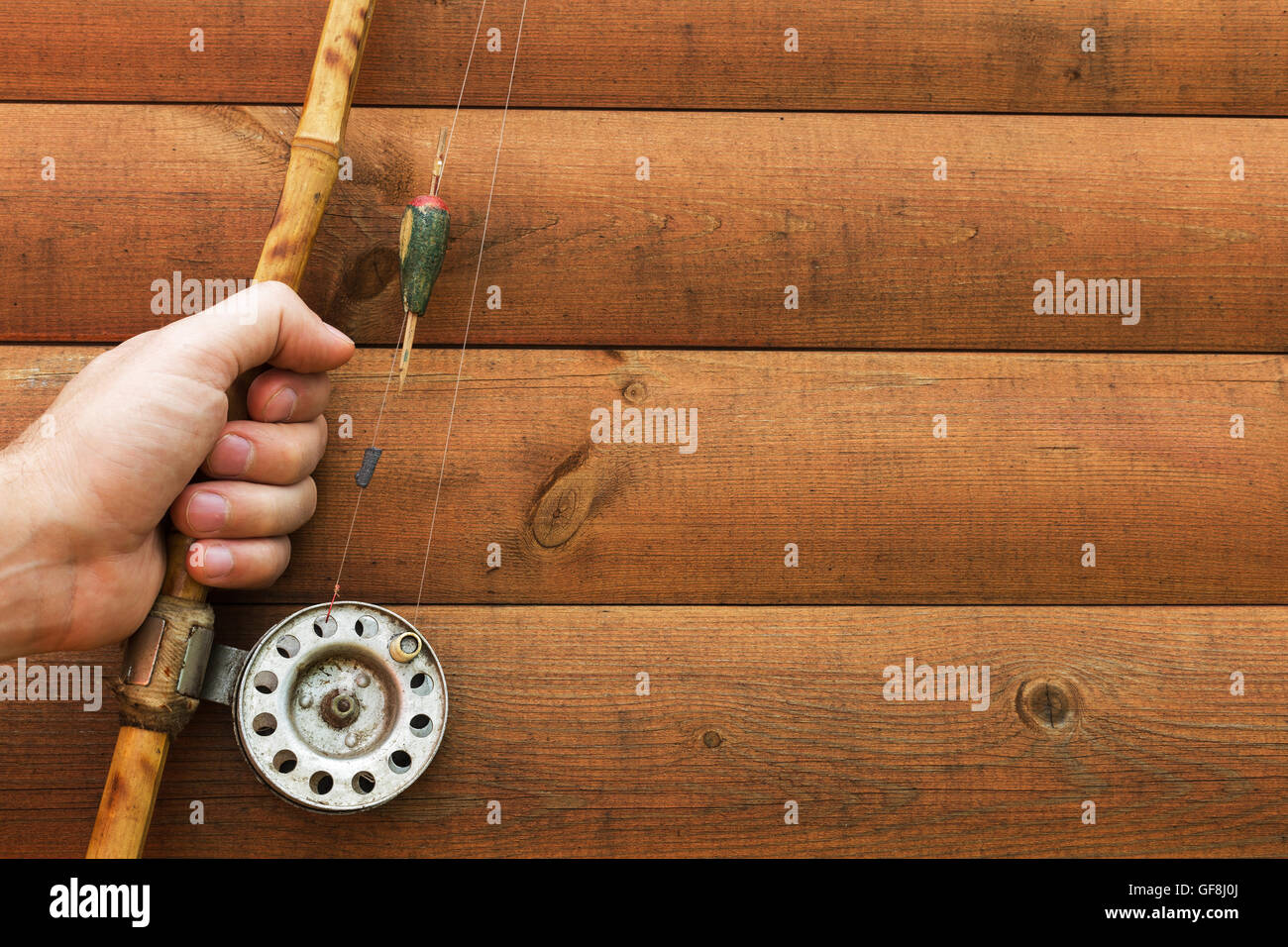 Old bamboo rod to catch fish Stock Photo - Alamy