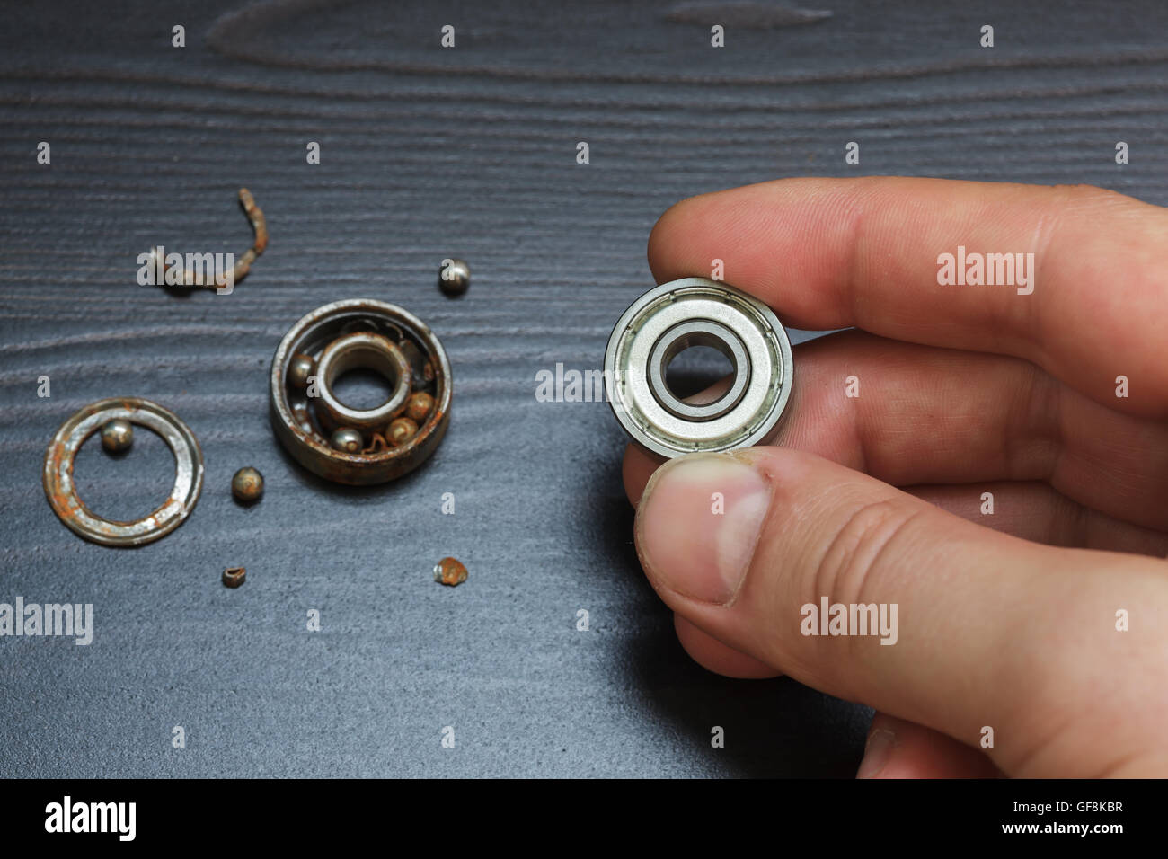 Spoiled collapsed and a new bearing for rollers and scooters Stock ...