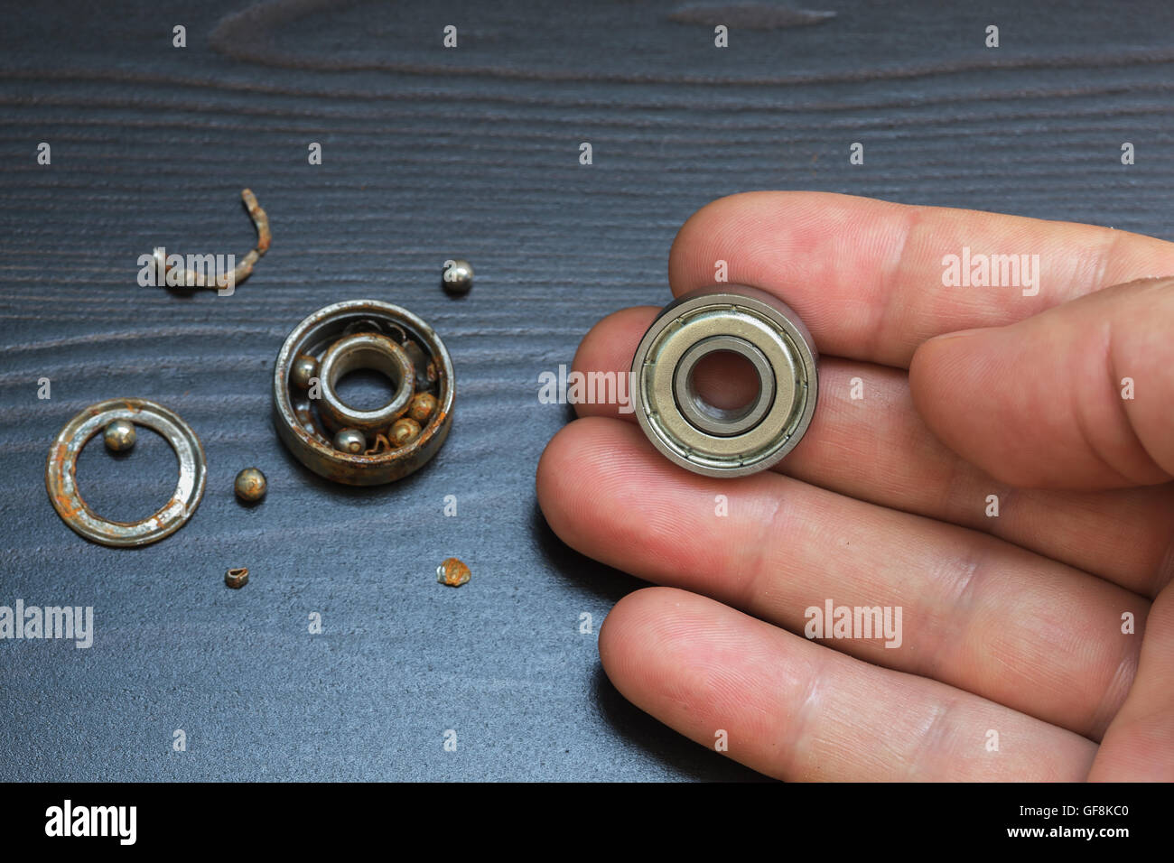 Spoiled collapsed and a new bearing for rollers and scooters Stock ...