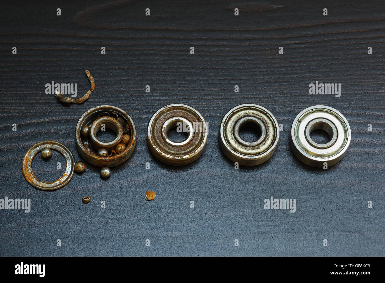 Spoiled collapsed and a new bearing for rollers and scooters Stock ...