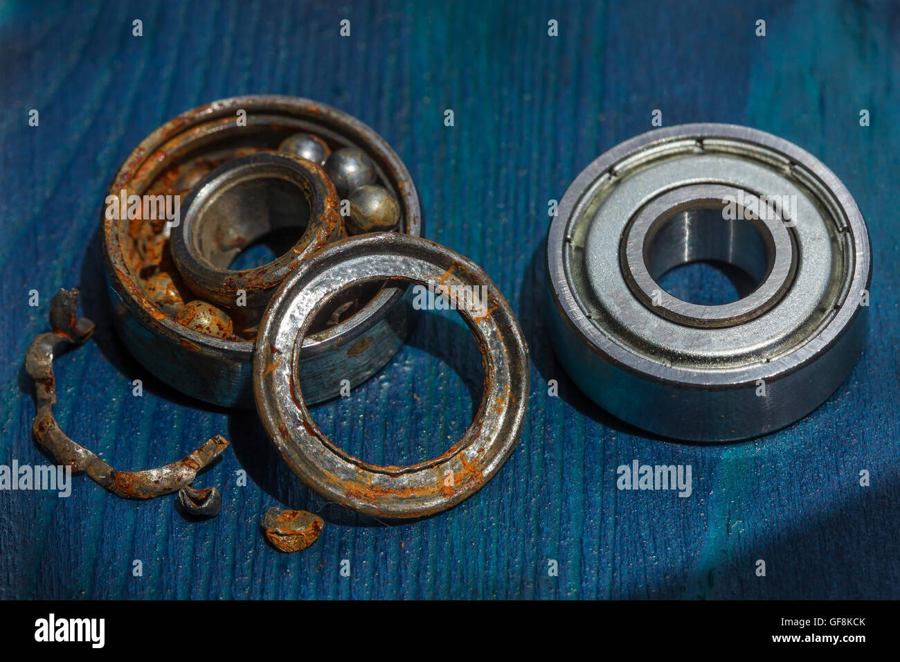 Spoiled collapsed and a new bearing for rollers and scooters Stock ...