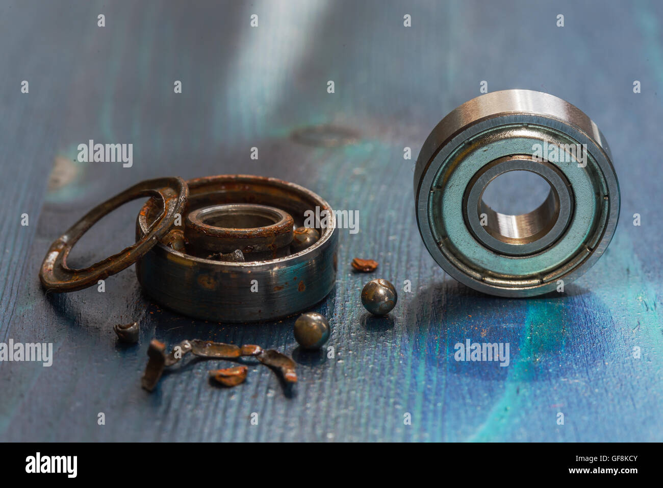 Spoiled collapsed and a new bearing for rollers and scooters Stock ...