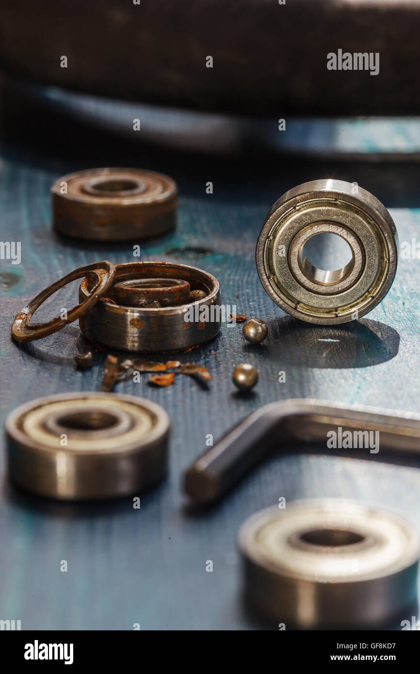 Spoiled collapsed and a new bearing for rollers and scooters Stock ...