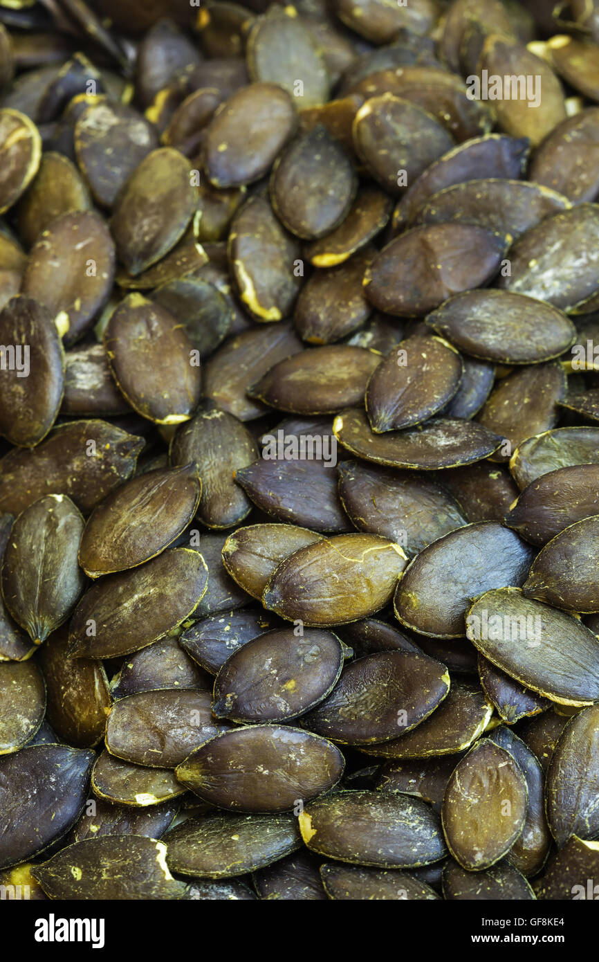 Peeled pumpkin seeds closeup Stock Photo - Alamy