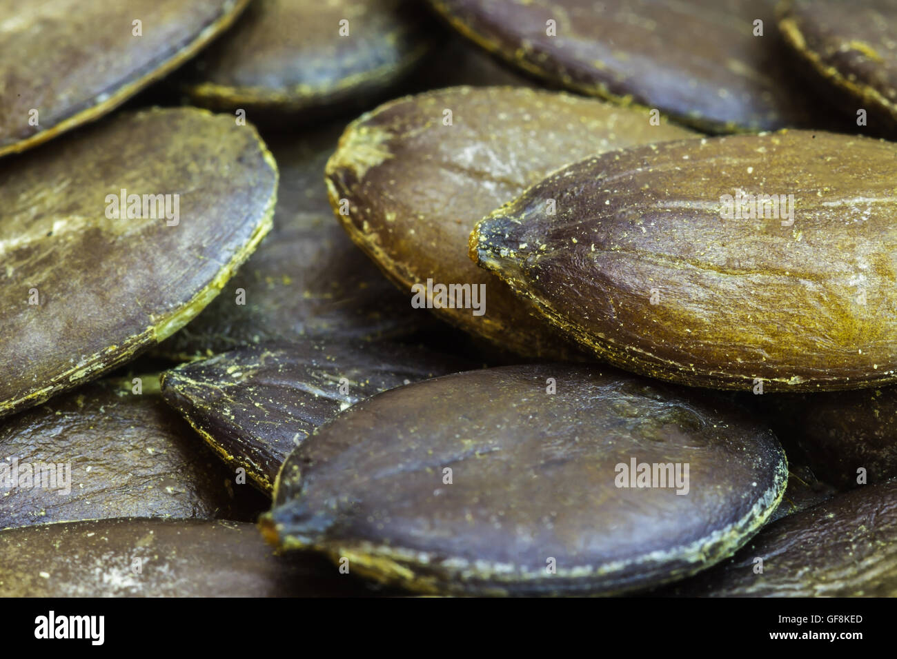 Peeled pumpkin seeds closeup Stock Photo - Alamy