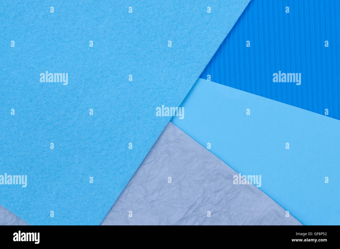 sheets of blue color paper background texture Stock Photo - Alamy