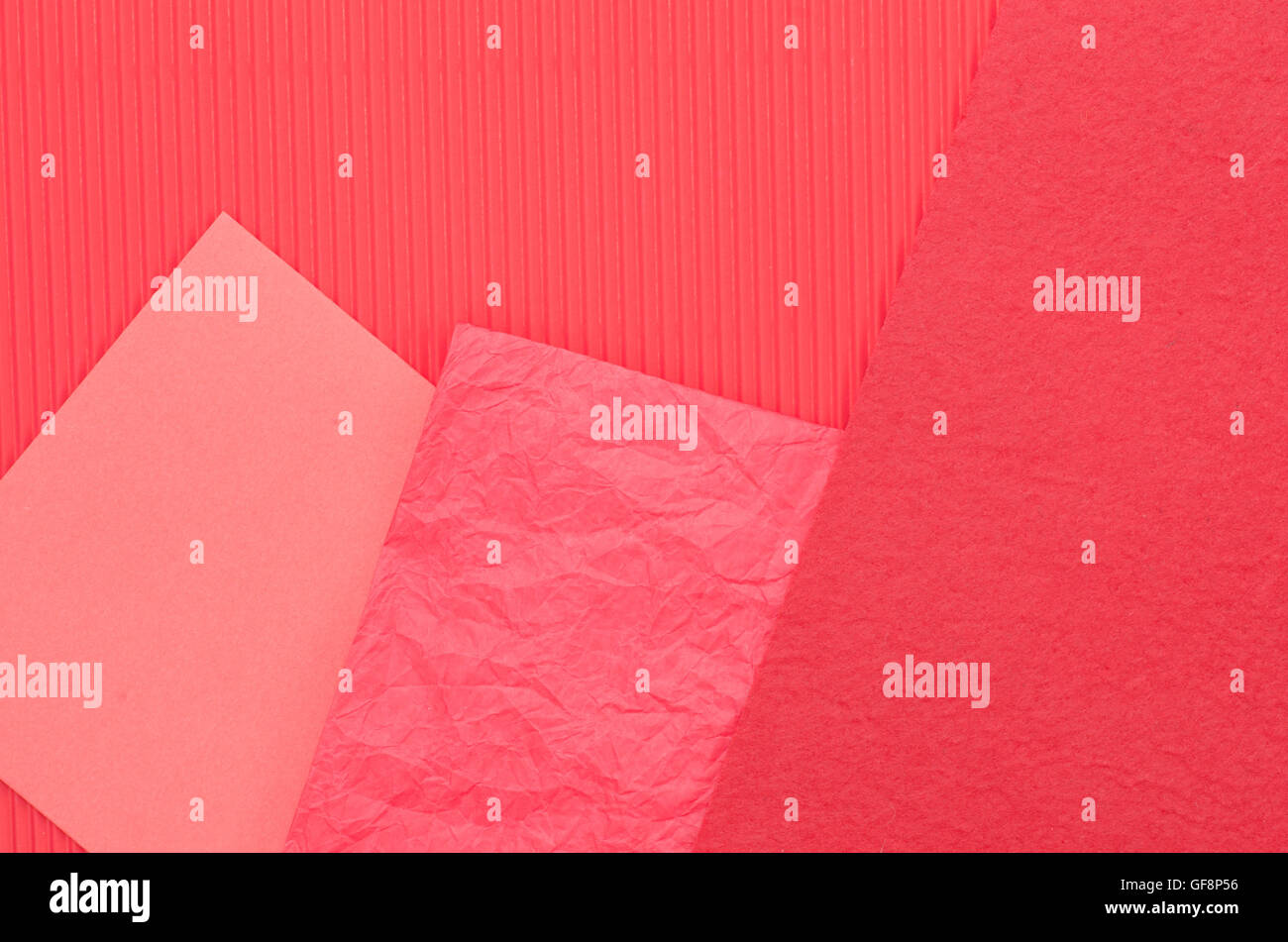 sheets of red color paper background texture Stock Photo - Alamy