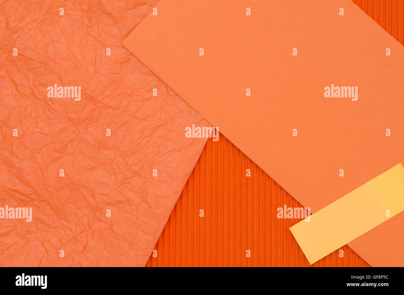 sheets of orange color paper background texture Stock Photo - Alamy