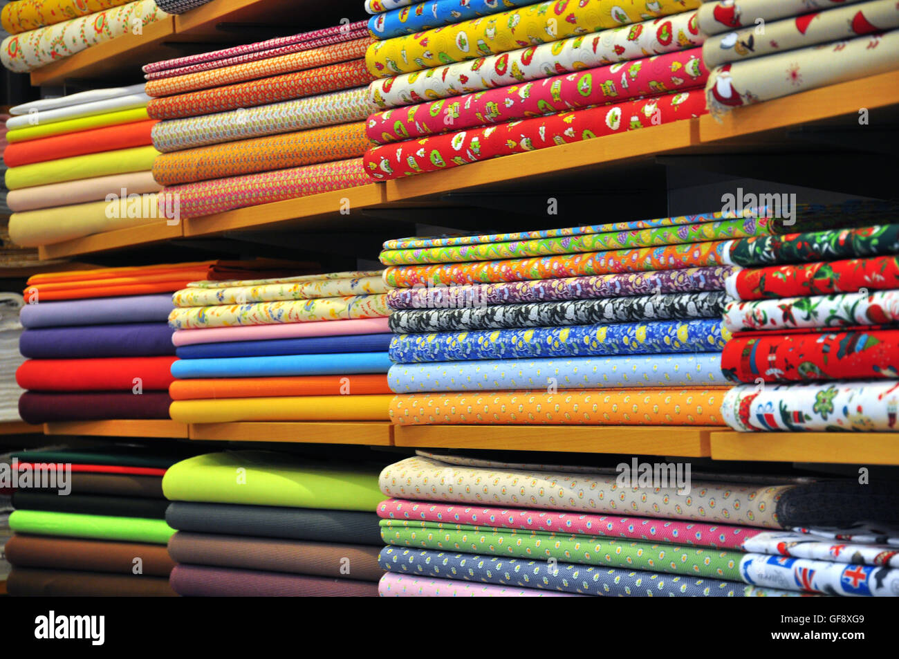 Heap of multicolor cloth fabric Stock Photo - Alamy