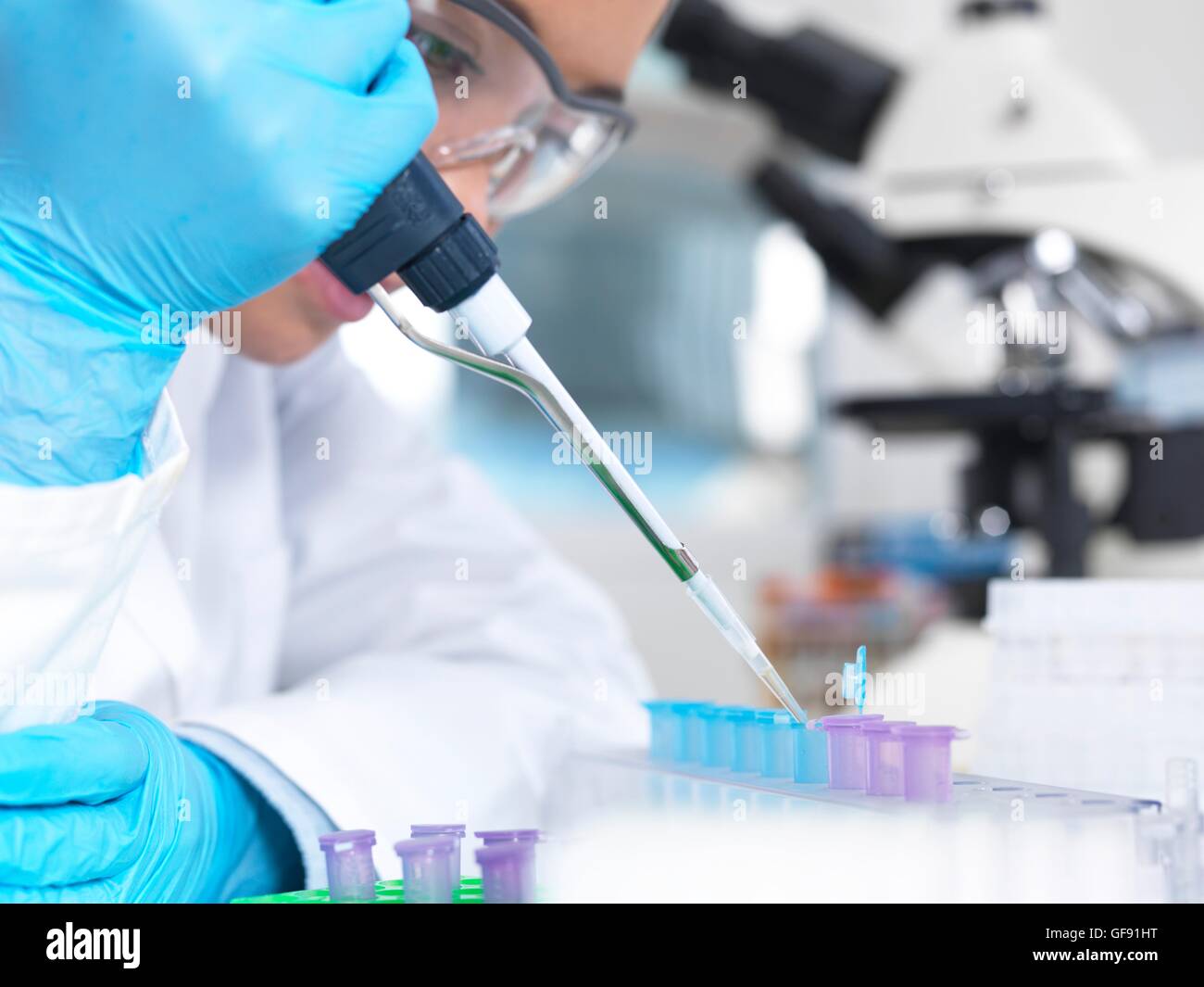 PROPERTY RELEASED. MODEL RELEASED. Preparing sample vials. Laboratory ...